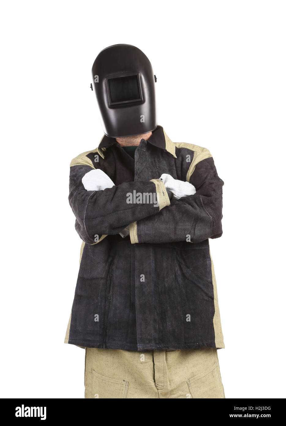 Welder in helmet and uniform Stock Photo - Alamy