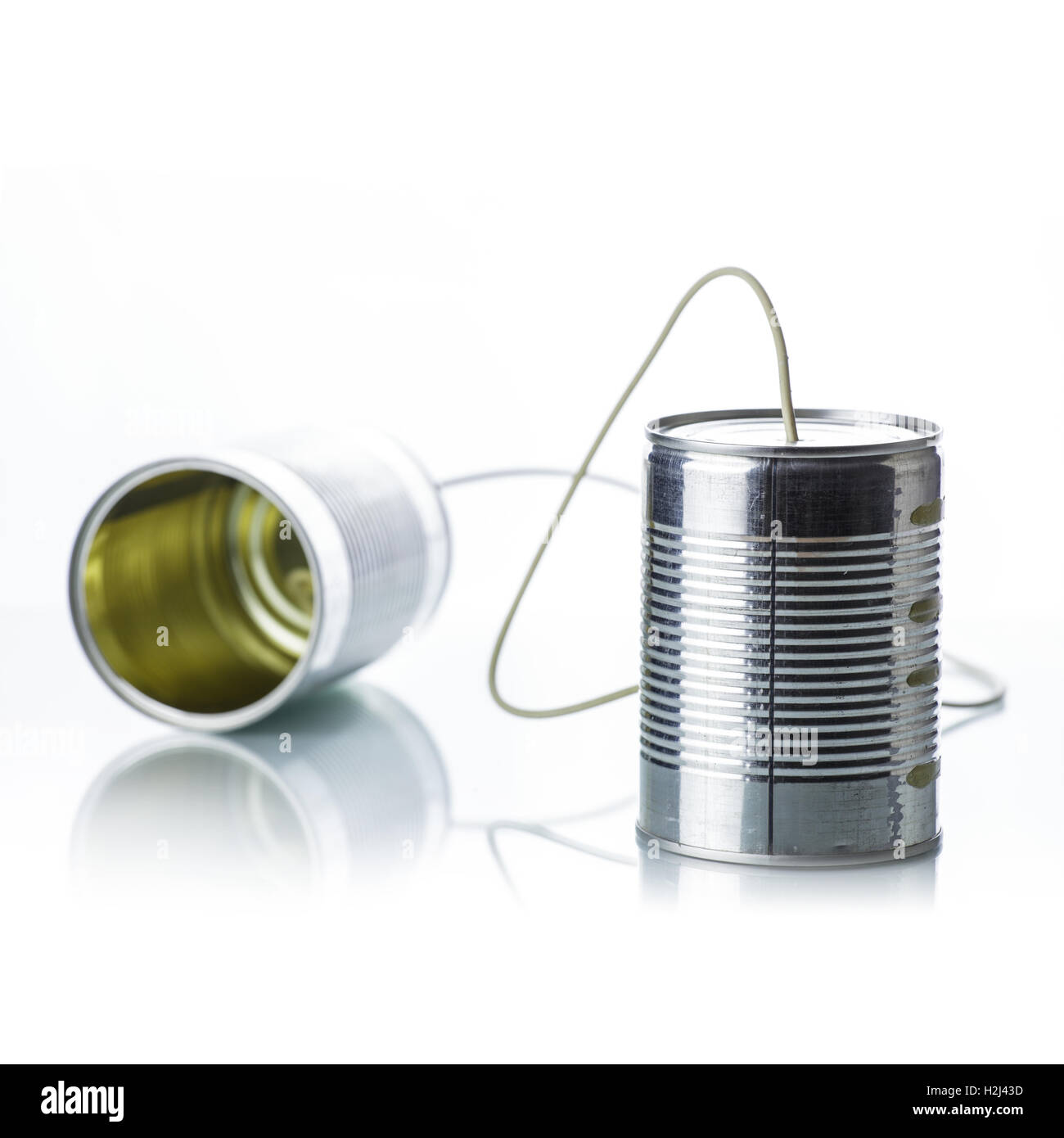 Tin cans telephone Stock Photo - Alamy