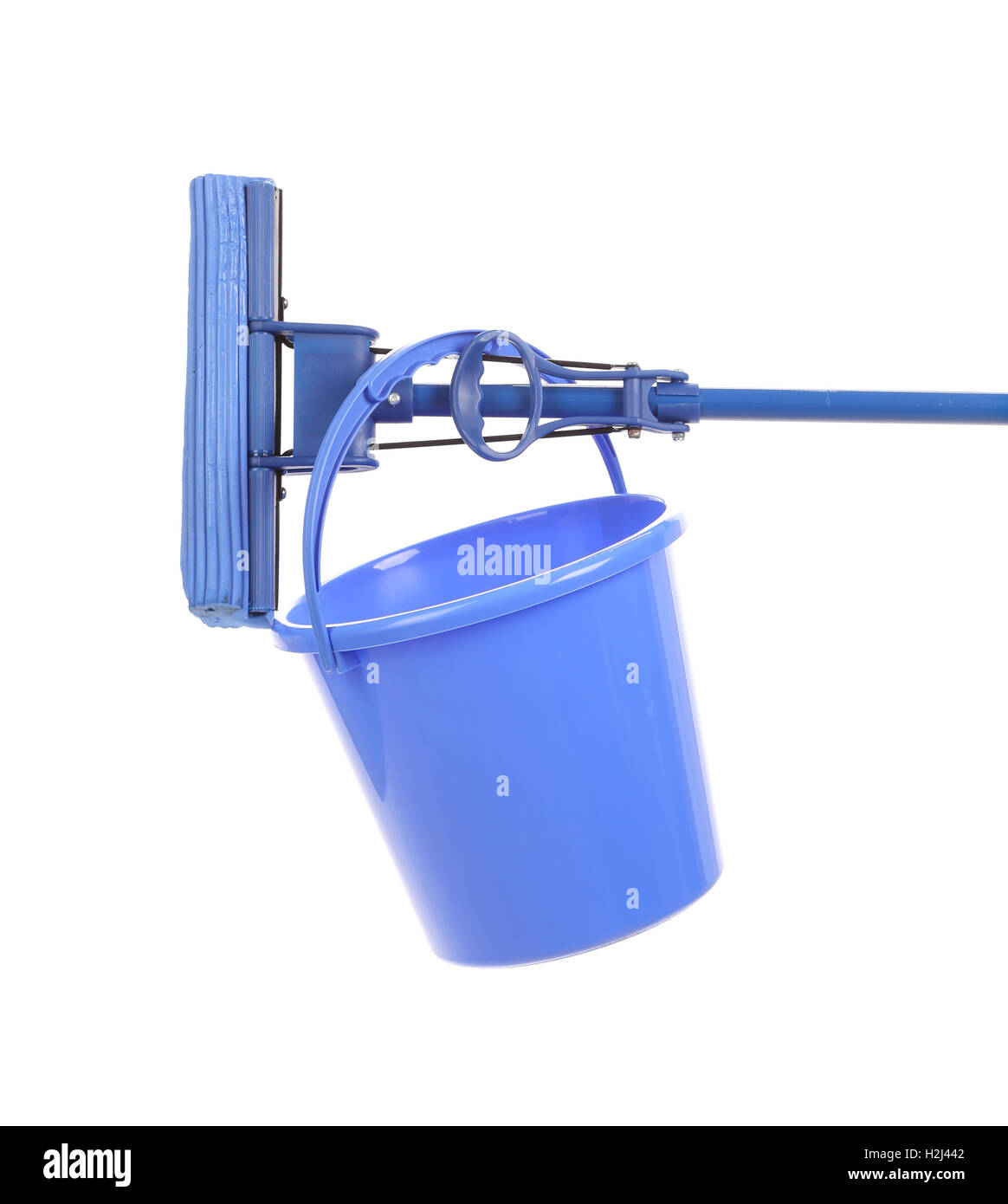 Blue broom and plastic basket Stock Photo - Alamy