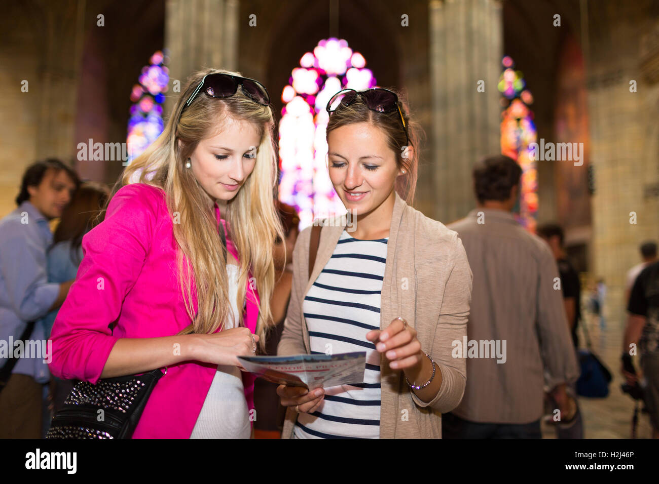 Two pretty, young women sightseeing in Prague historic center Stock ...