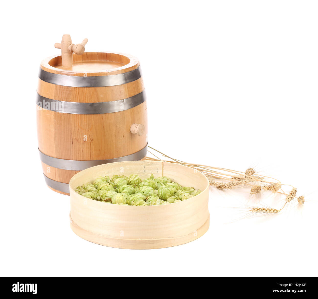 Beer in wooden mug Cut Out Stock Images & Pictures - Alamy