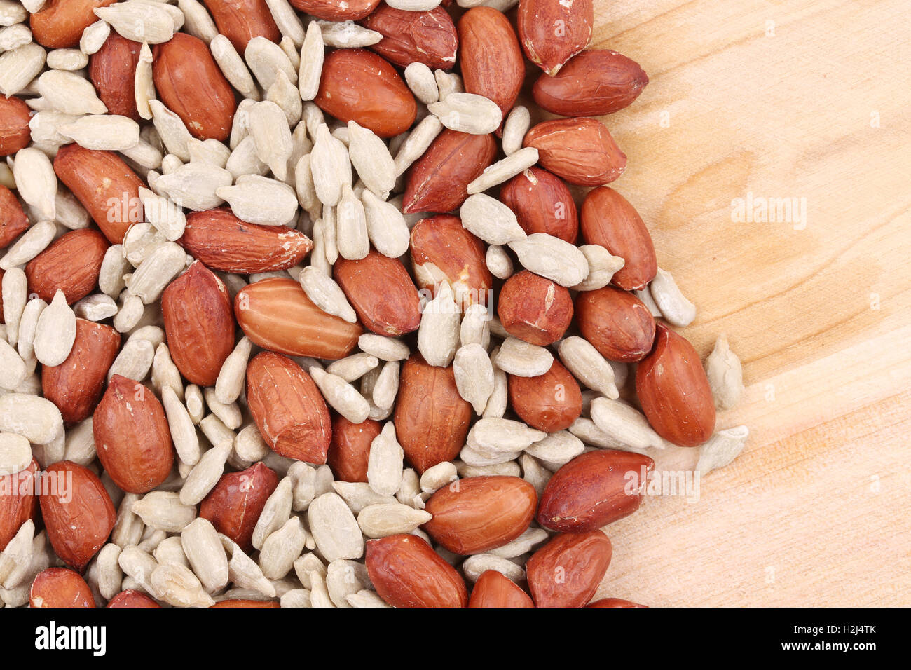 Peanuts and sunflower seeds Stock Photo - Alamy