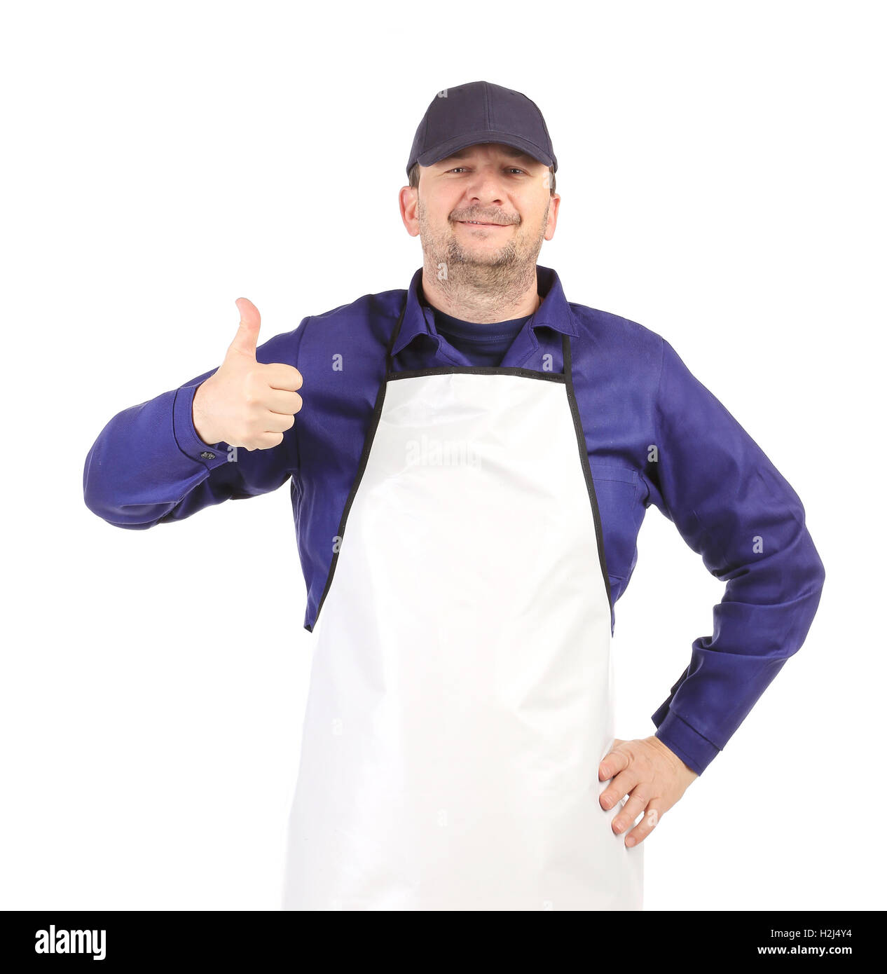 Smiling man dressed in apron Stock Photo - Alamy