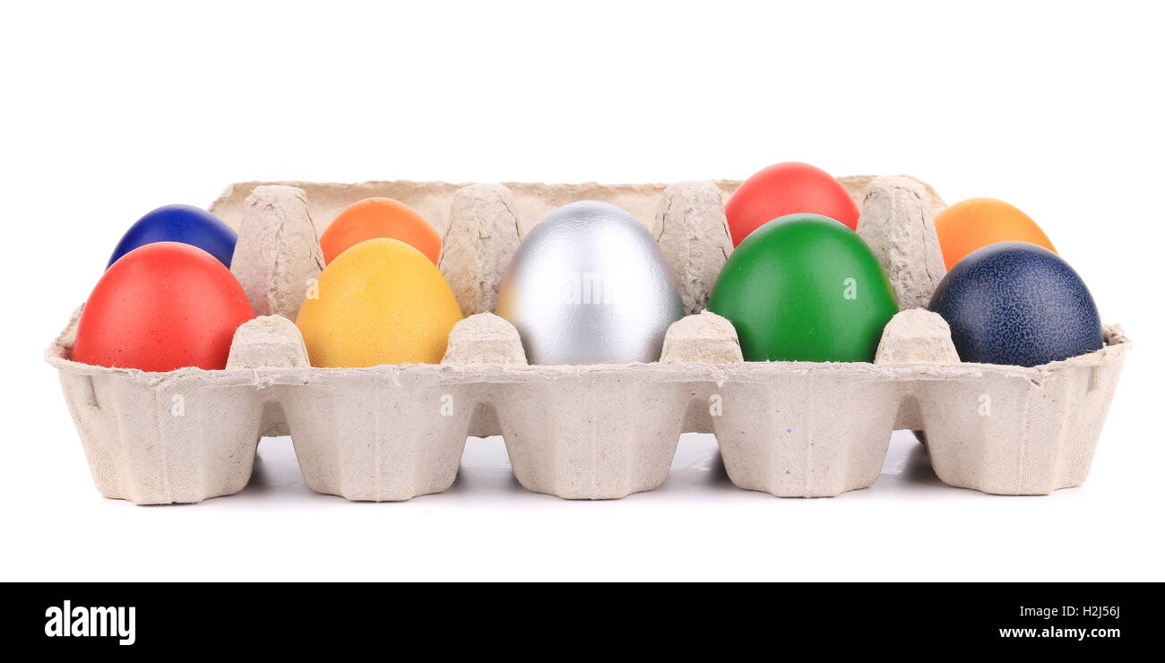 Cardboard egg box with Easter colored eggs Stock Photo - Alamy