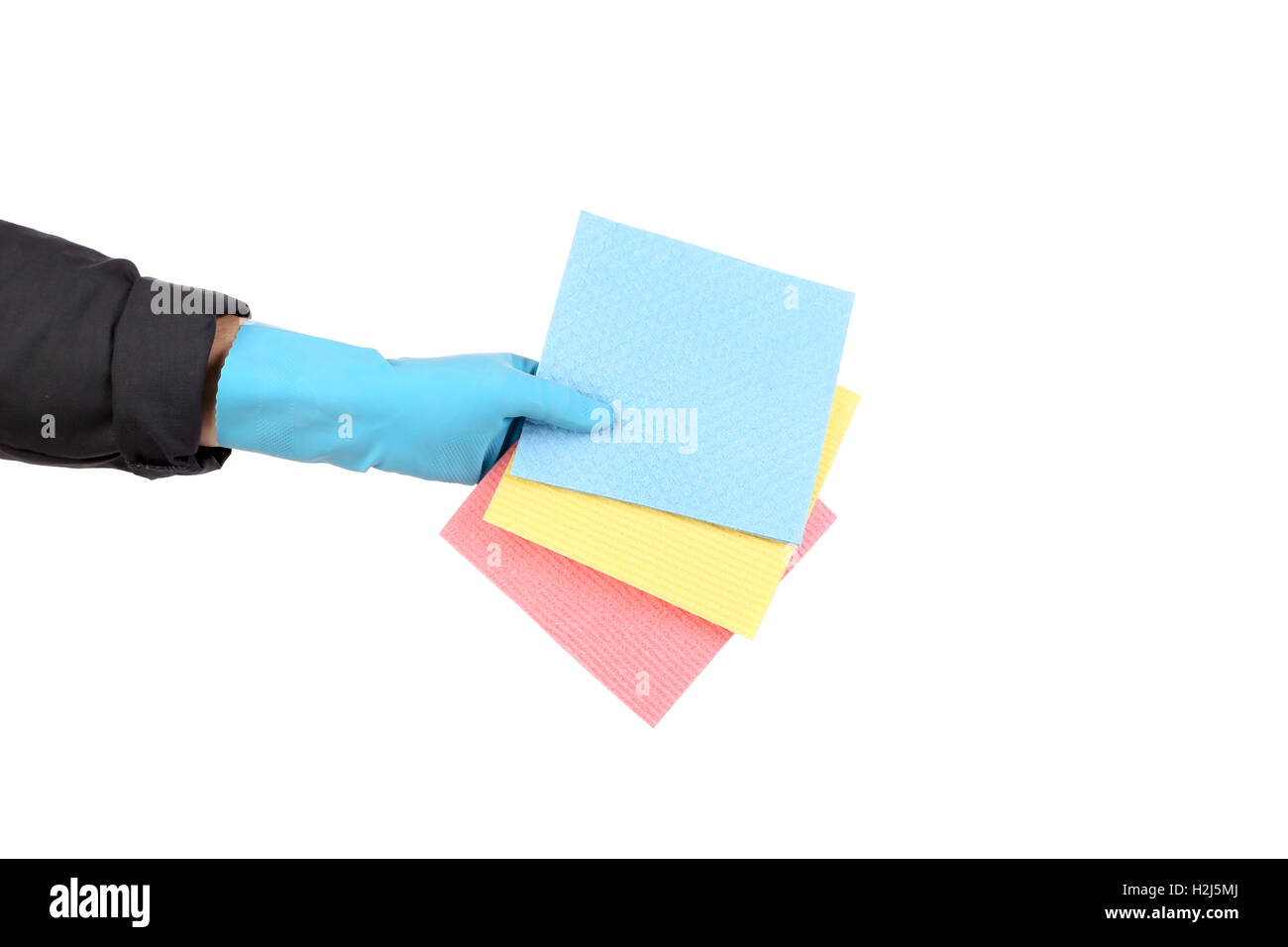 Hand holds different sponges Stock Photo - Alamy