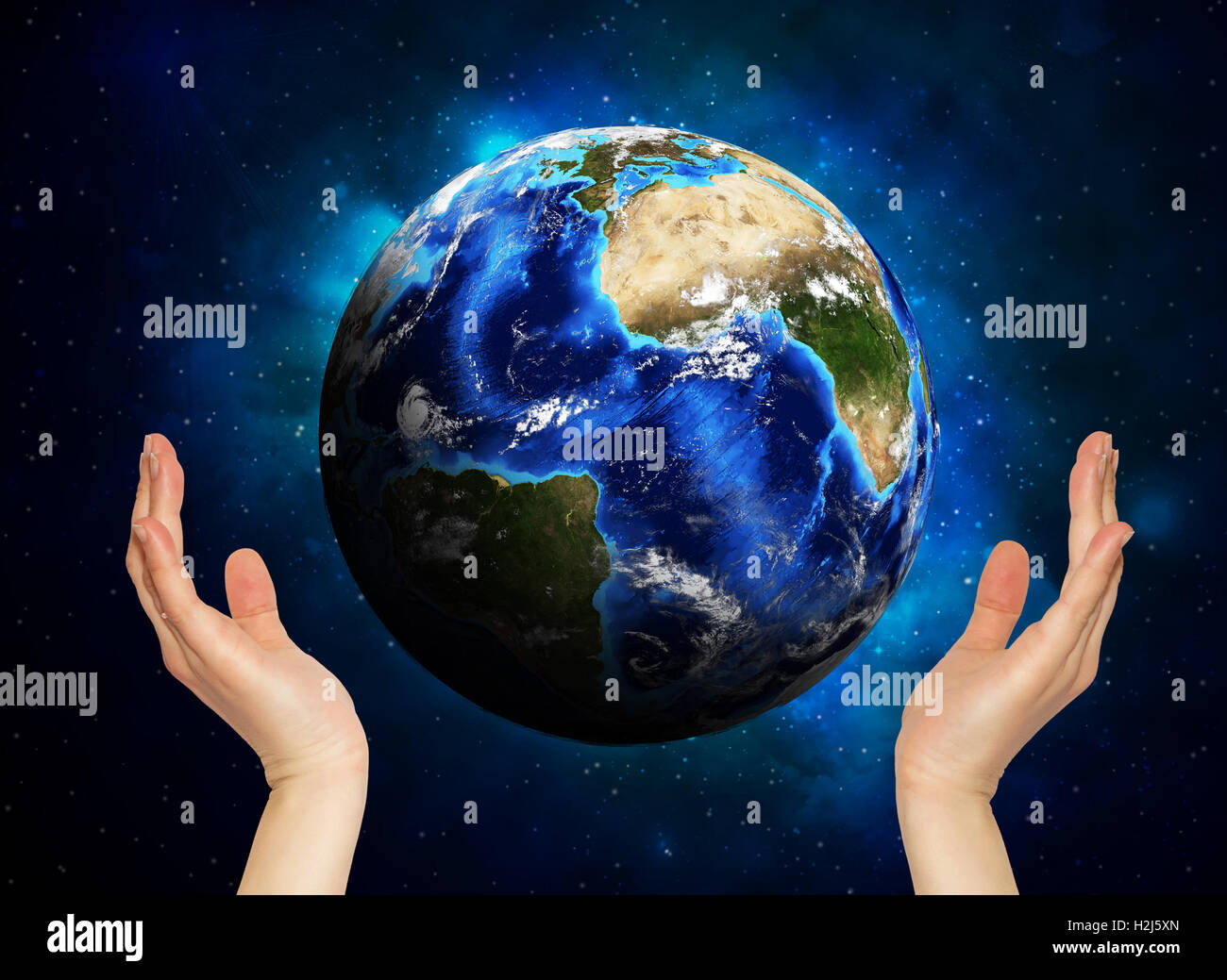 Hands holding earth Stock Photo - Alamy