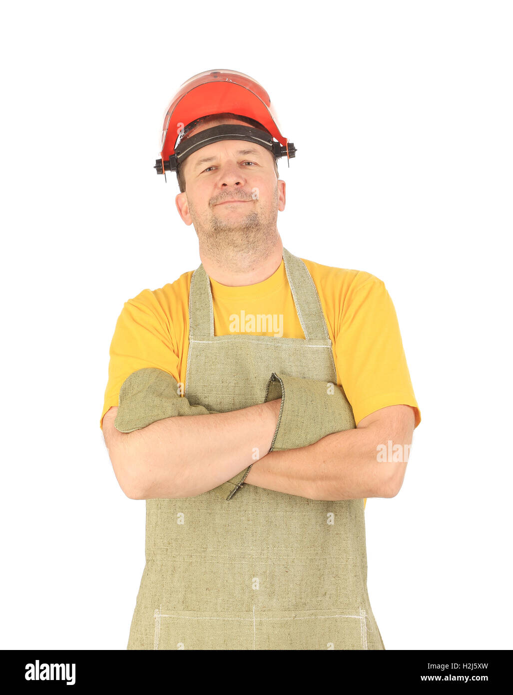 Man in red hard cap and apron Stock Photo - Alamy