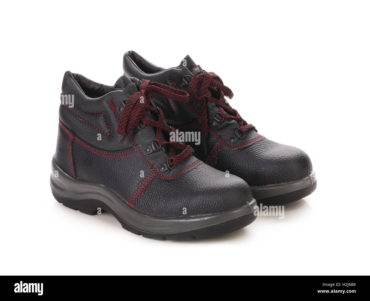 Black boots with red laces Stock Photo - Alamy