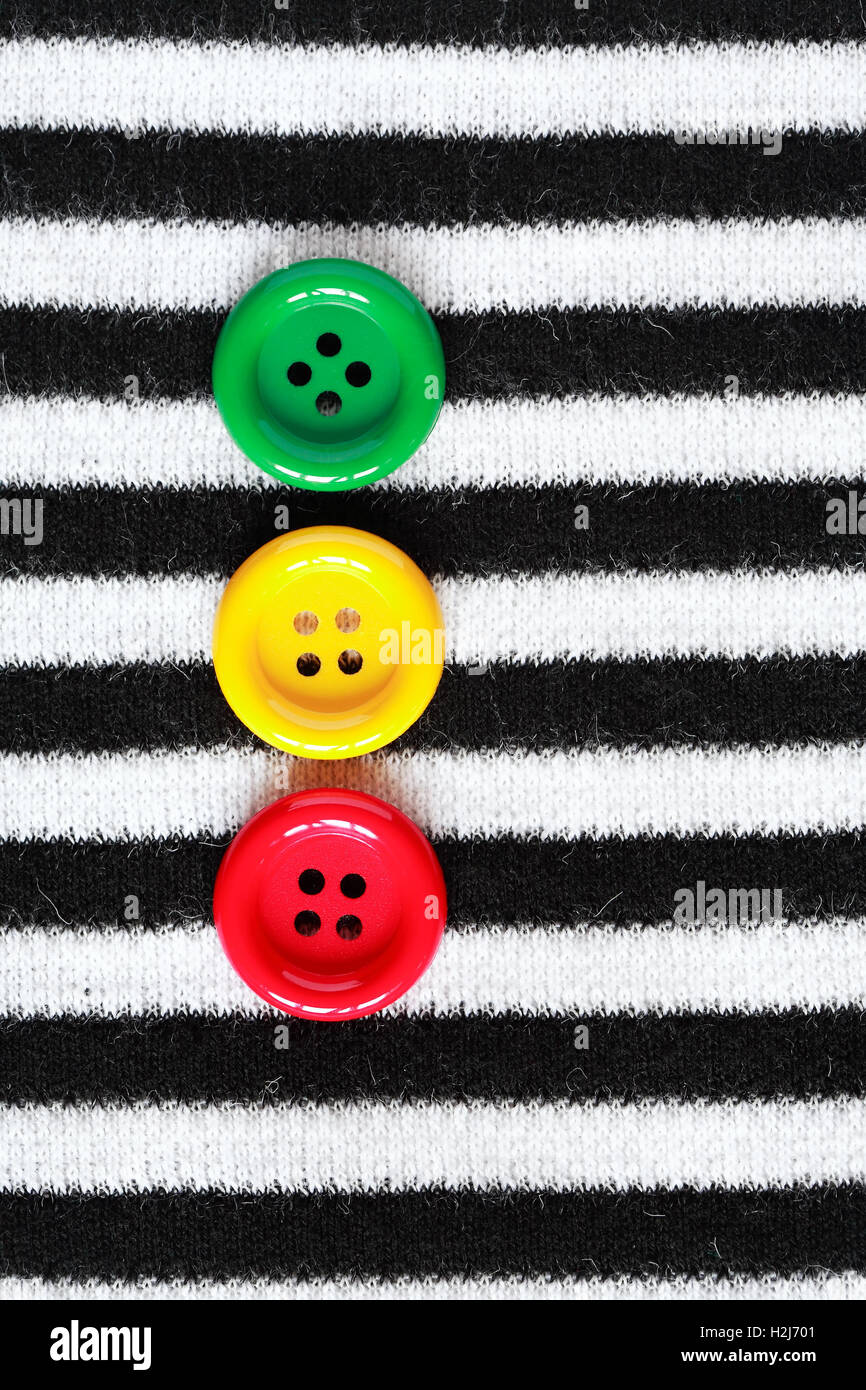 Buttons On Striped Vest Stock Photo - Alamy