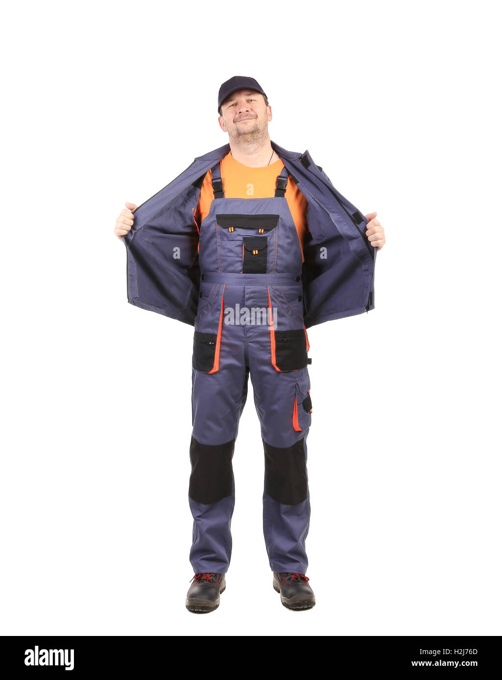 Man in blue overall Stock Photo - Alamy