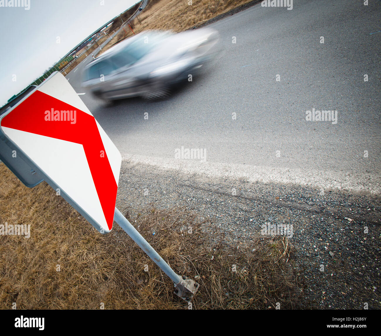 Traffic concept: car driving fast through a sharp turn Stock Photo - Alamy