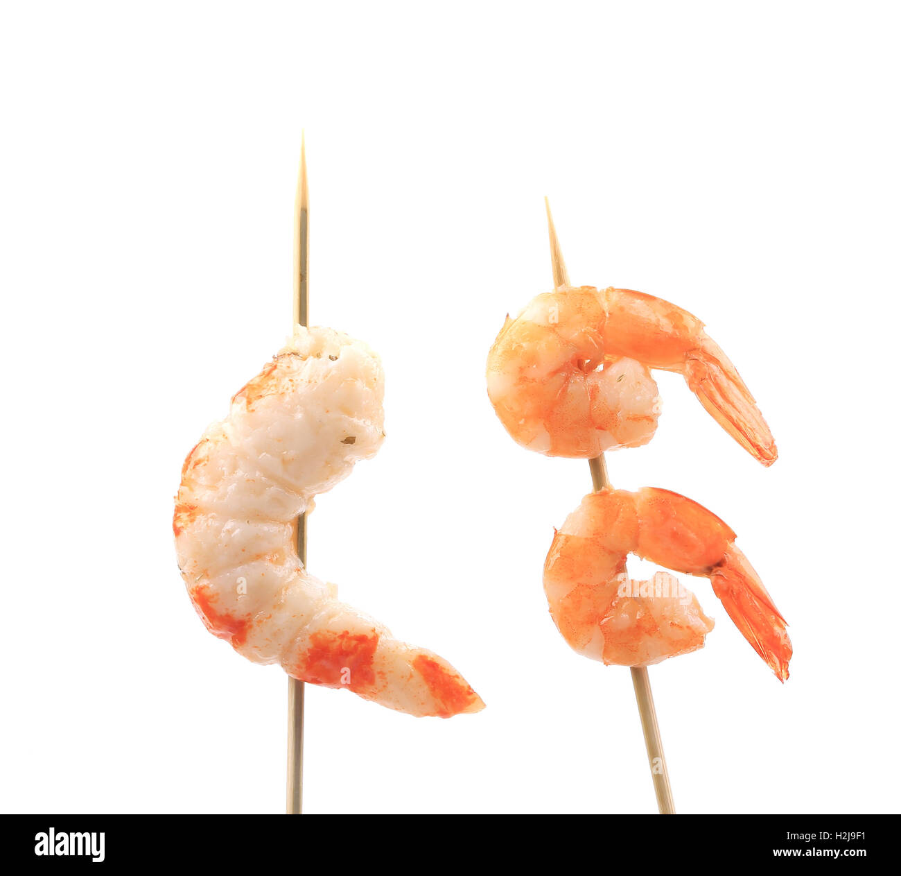 Three shrimp on a stick Stock Photo - Alamy