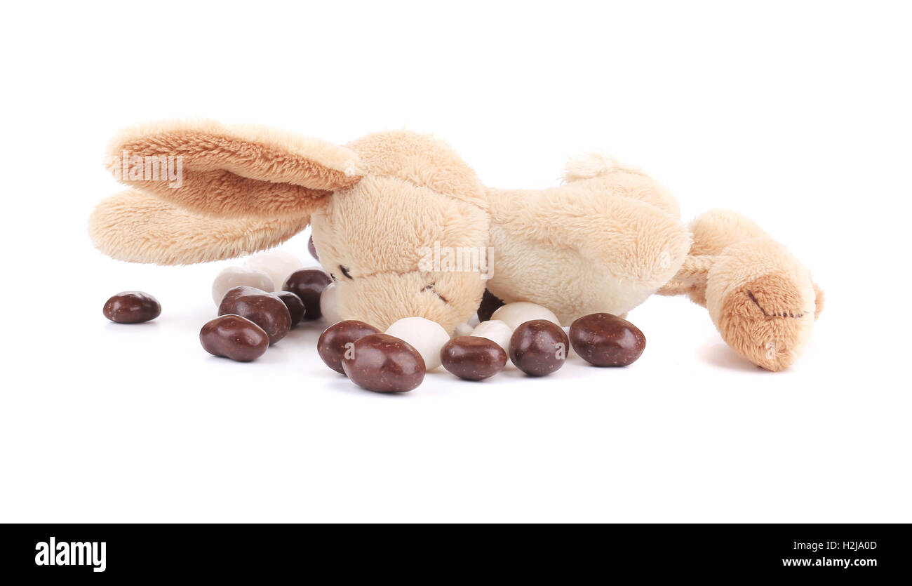 Toy bunny with dragees Stock Photo - Alamy