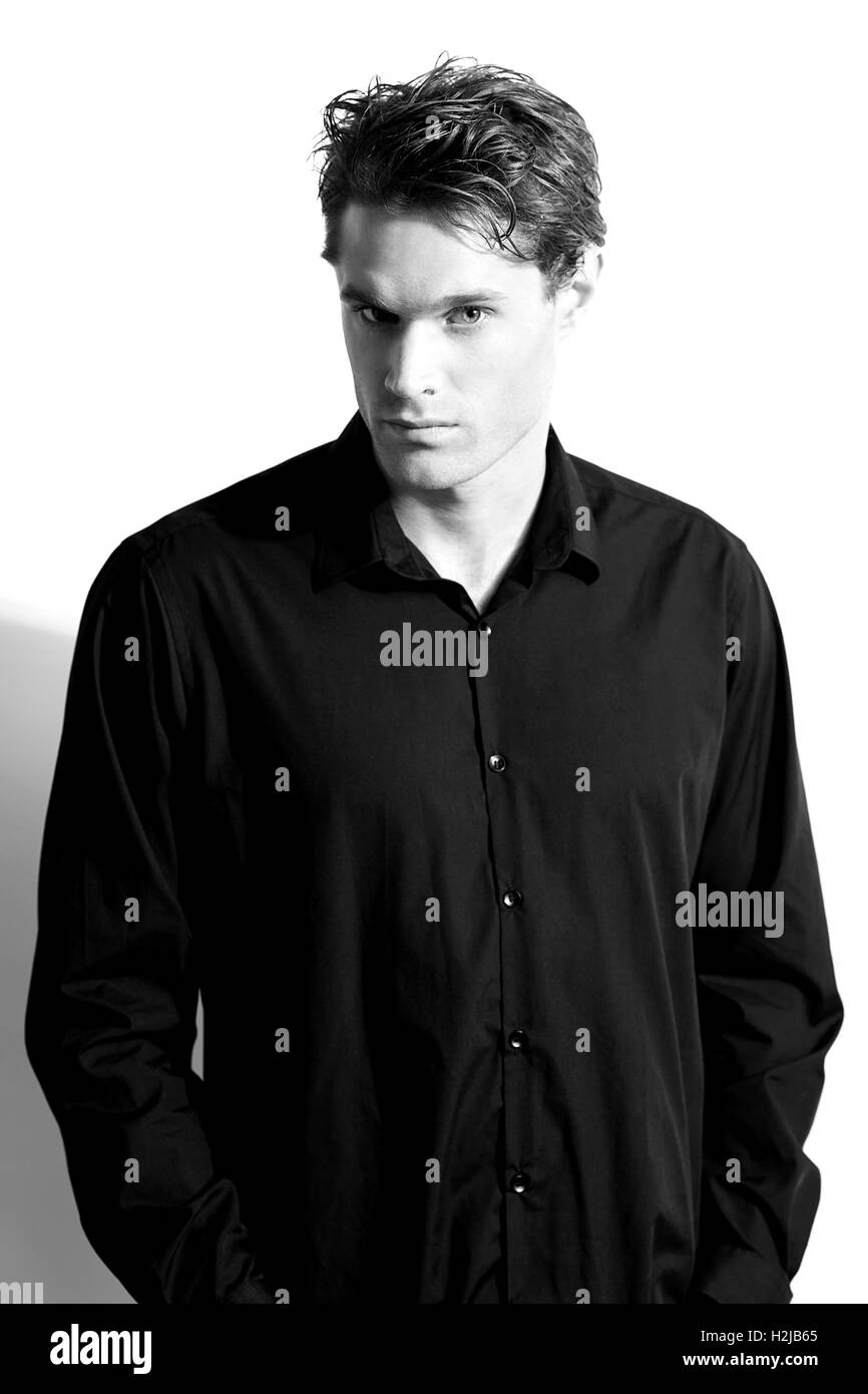 Smiling young guy posing Black and White Stock Photos & Images - Alamy