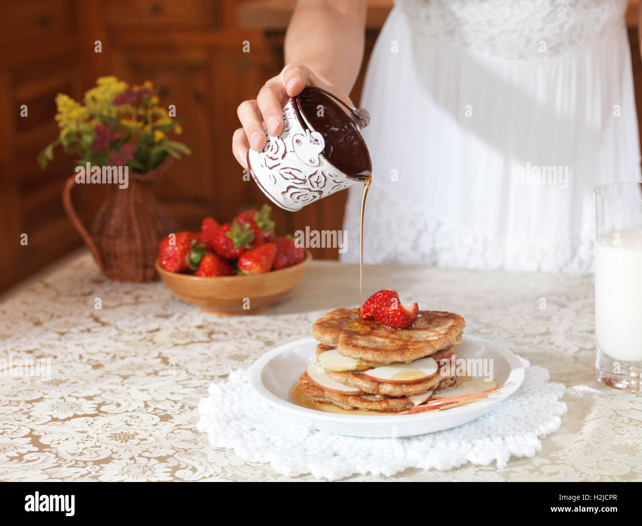 Hand pouring syrup hi-res stock photography and images - Alamy