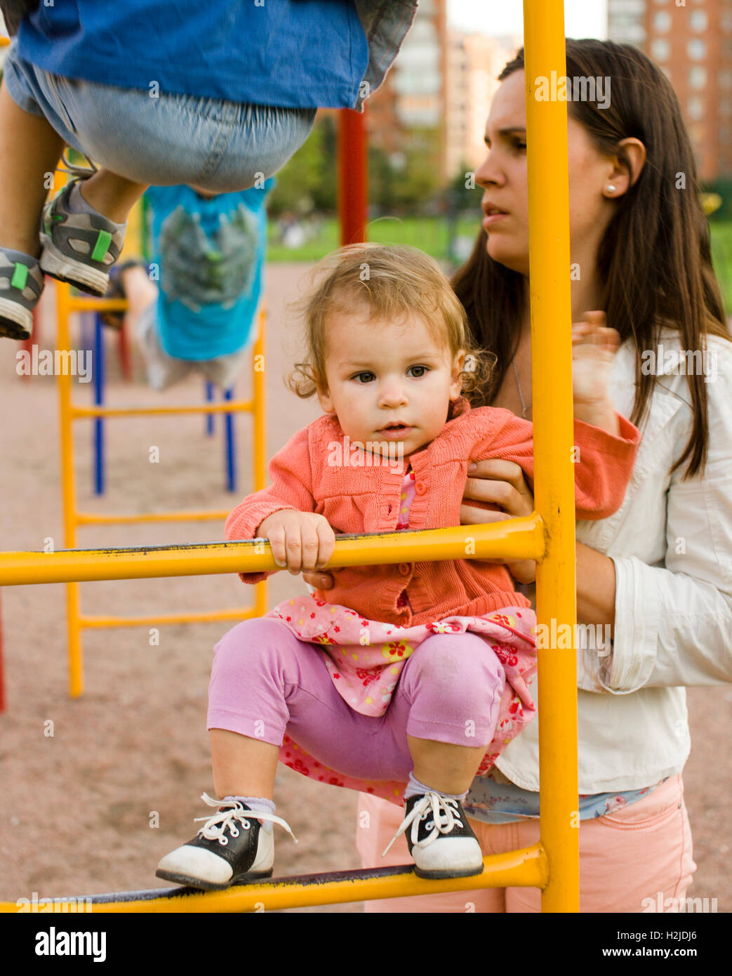 little cute boy and girl playing outside, adorable friendship, baby ...