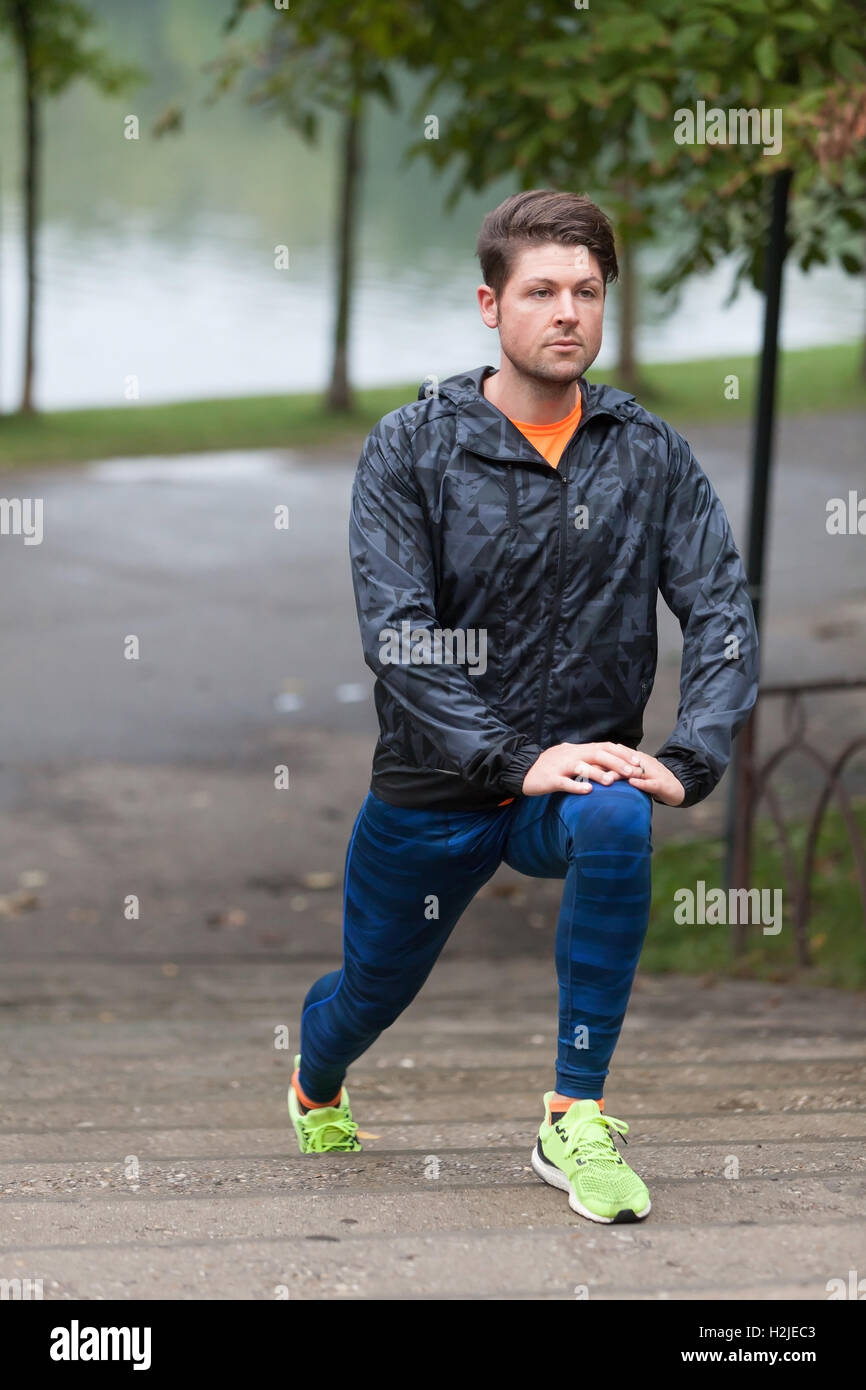 Athletic young man preparing for his morning running routine Stock ...