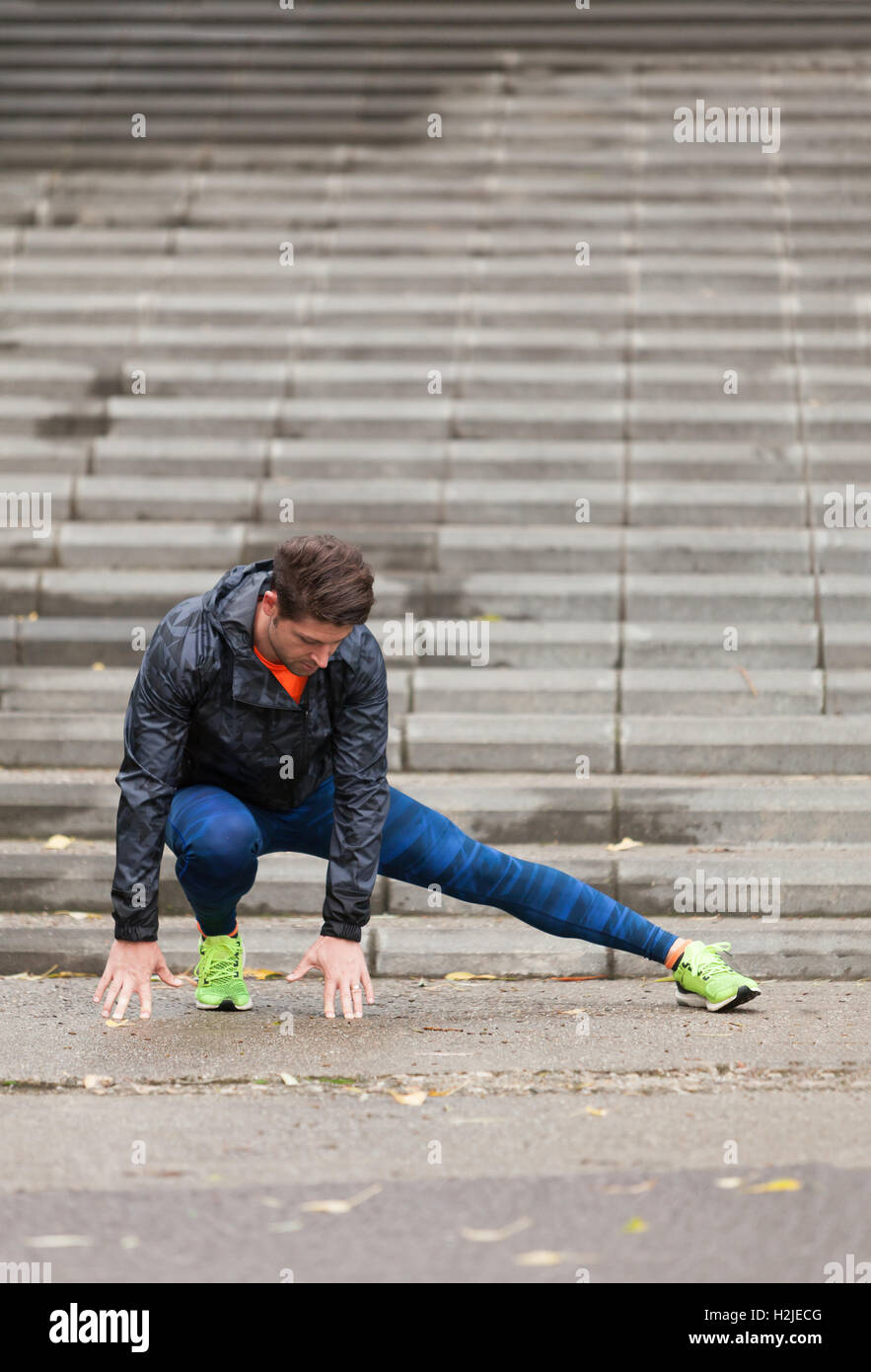 Athletic young man preparing for his morning running routine Stock ...