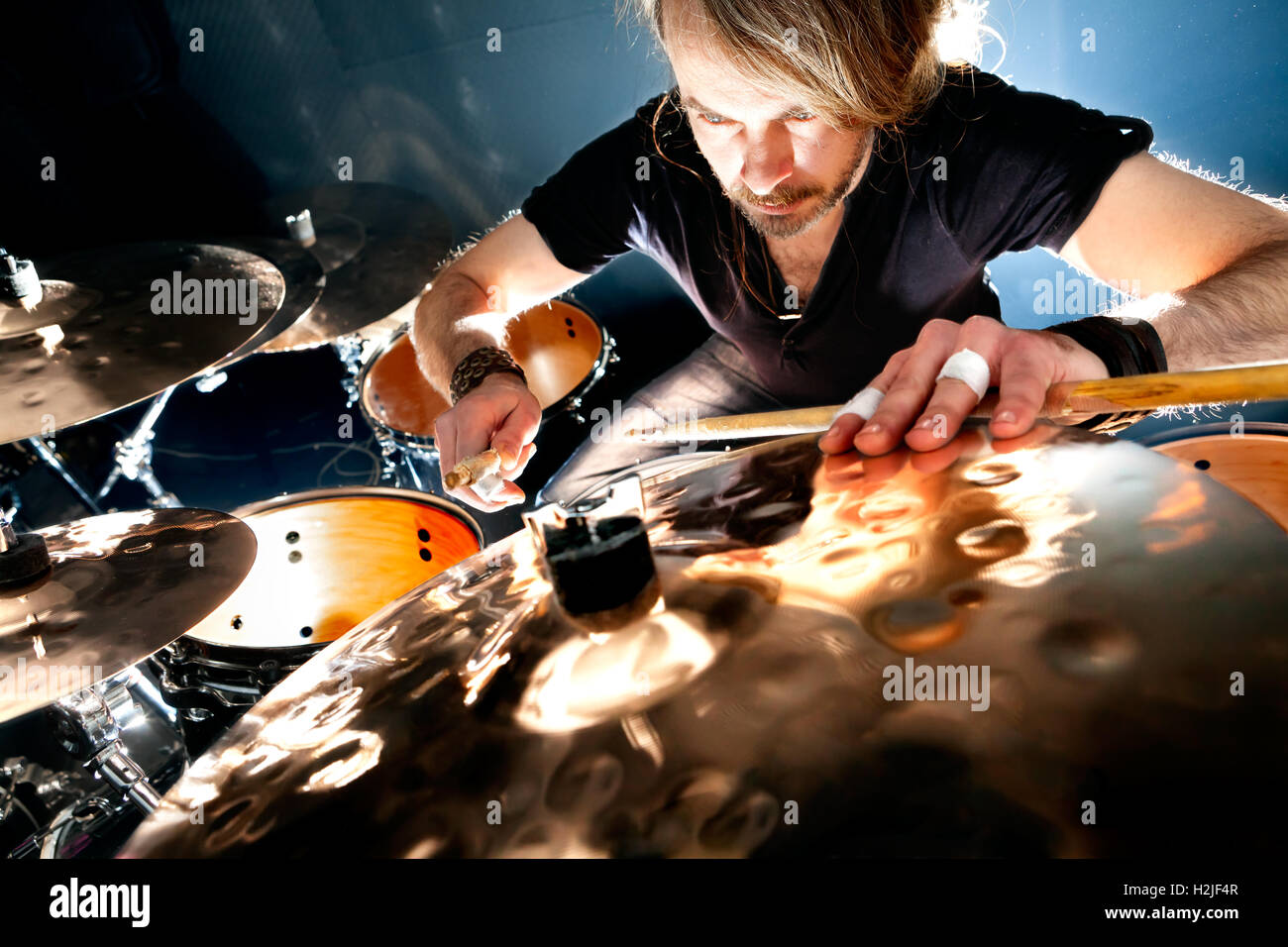 Man playing the drum.Live music background concept.Drummer and rock ...