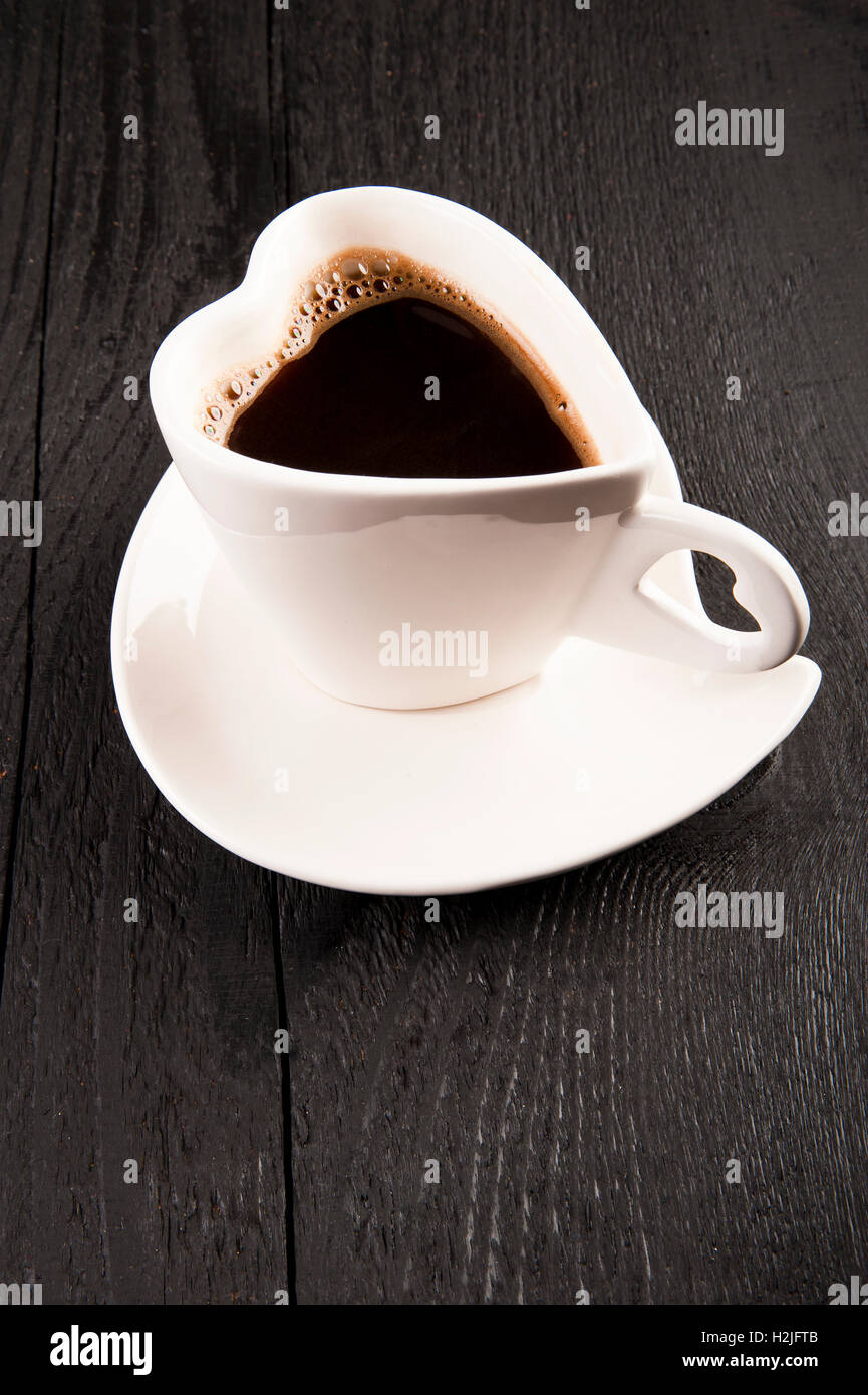 Cup of fresh coffee with heart sign Stock Photo - Alamy
