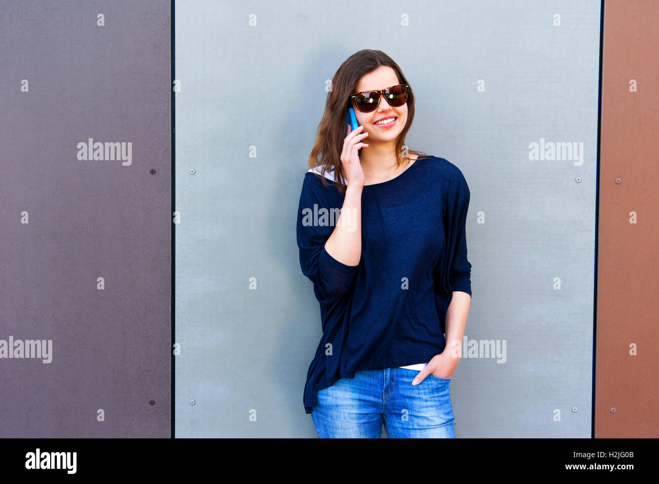 Girl having fun outdoors and calling smart phone, lifestyle. Big smile ...