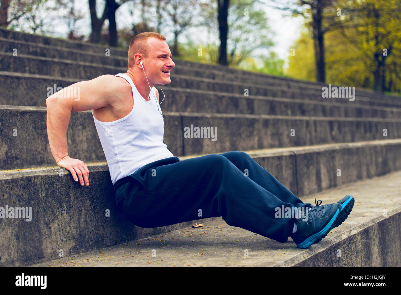 Active man in park exercise Stock Photo - Alamy