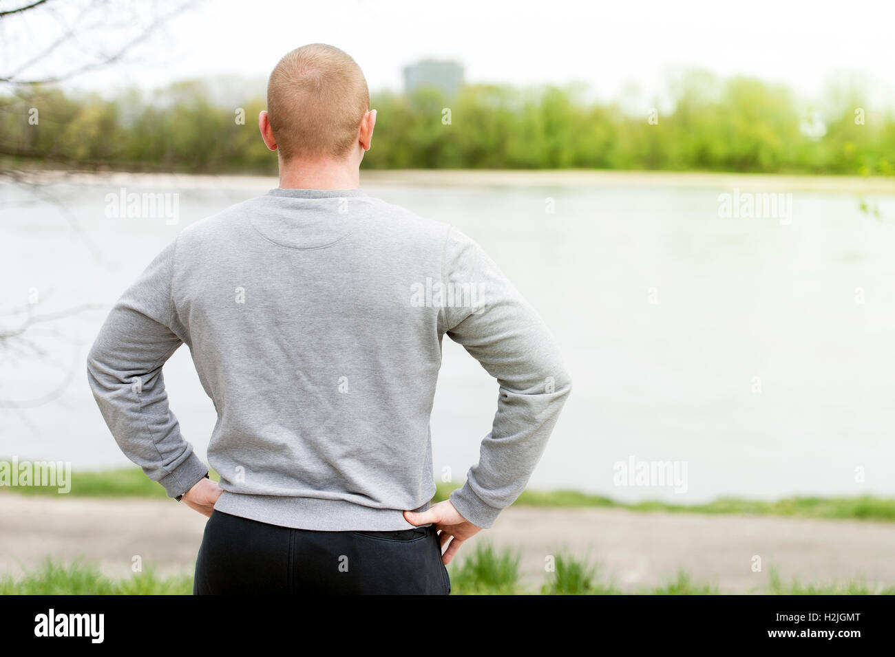 Man's back. Training outdoor loking on river Stock Photo - Alamy