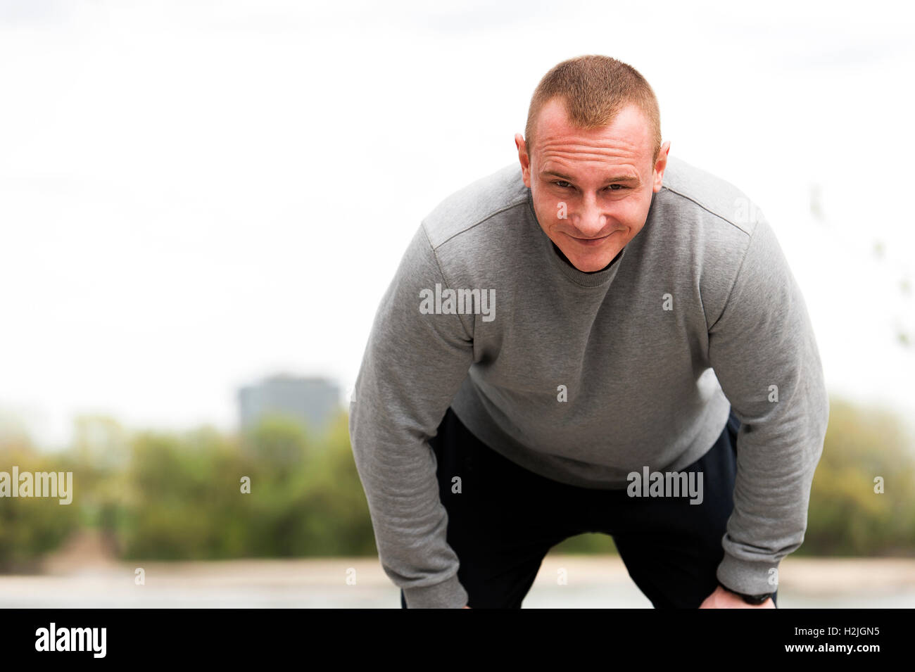 Man resting after run. Outdoor jogger Stock Photo - Alamy
