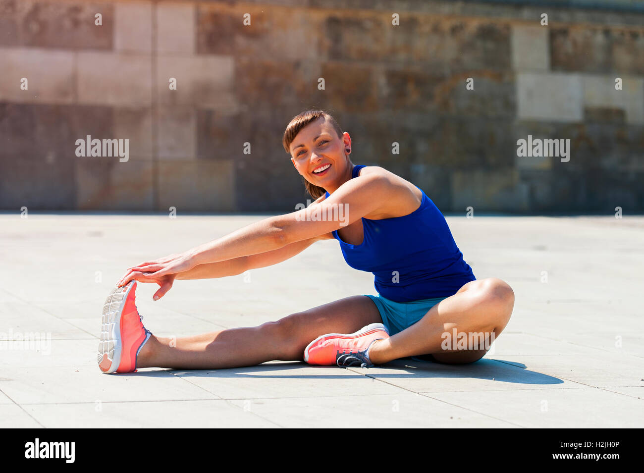 Stretching before after exercise hi-res stock photography and images ...