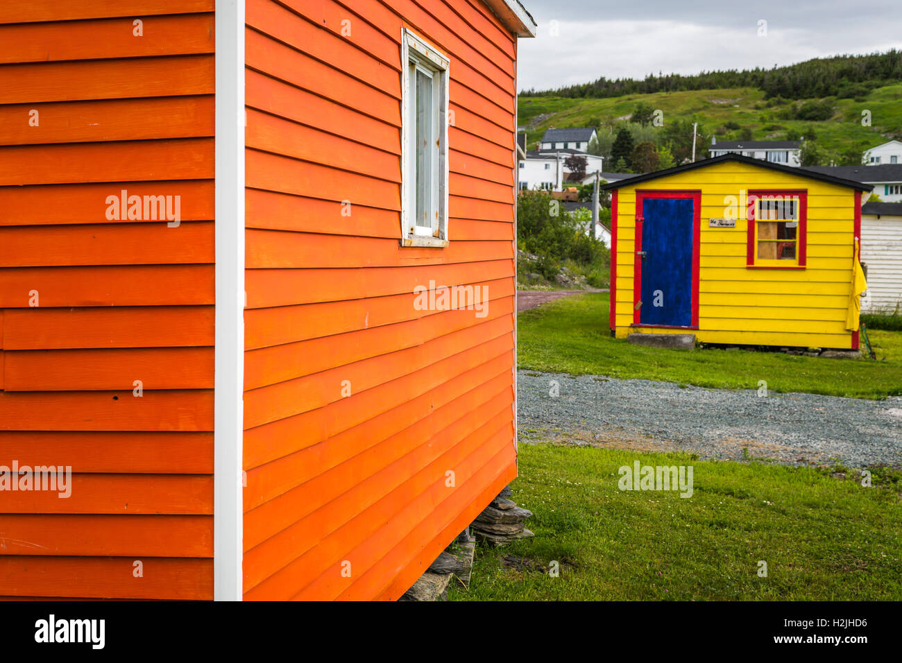 Fishing boats and colorful fishing stages in New Perlican, Newfoundland ...