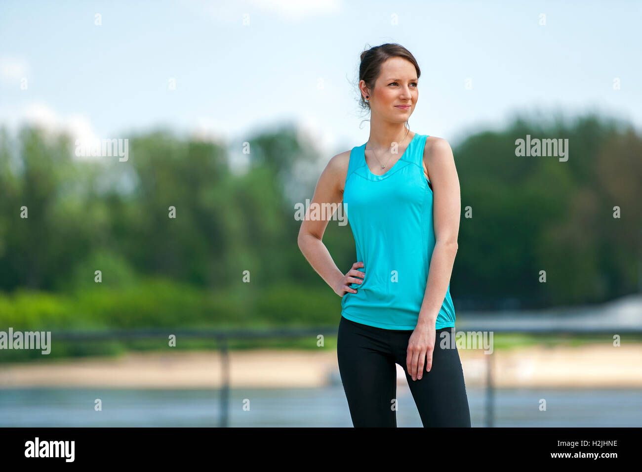 Woman resting after run Stock Photo - Alamy