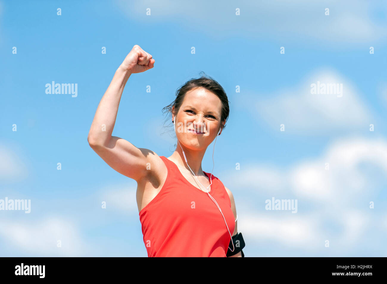 Fit woman happy of victory Stock Photo - Alamy