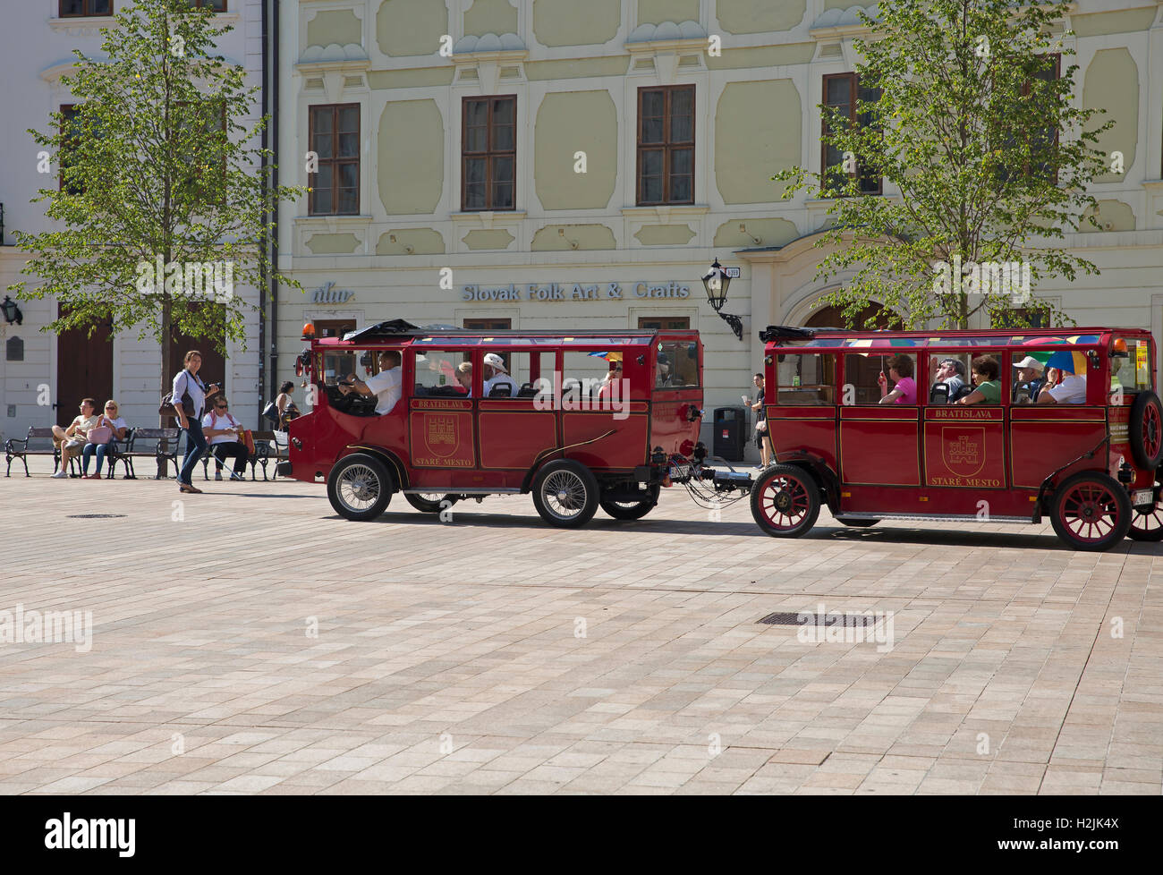 Old fashioned buses are used a transport to take tourists on a guided ...