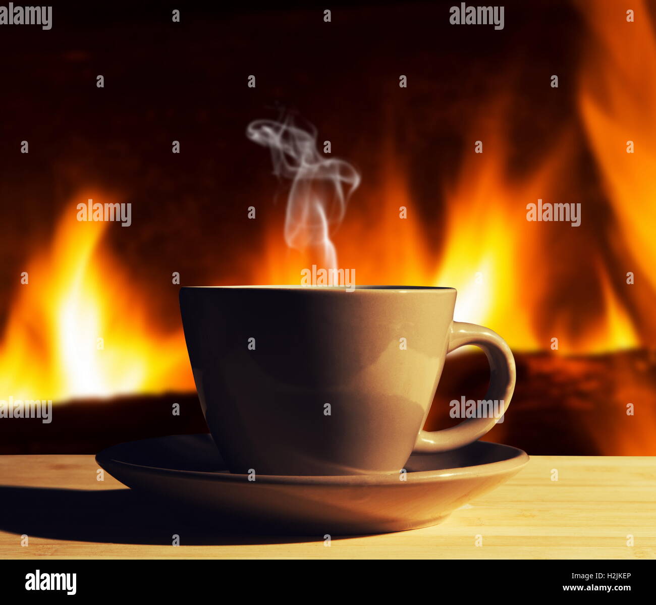cup of hot drink on table Stock Photo - Alamy