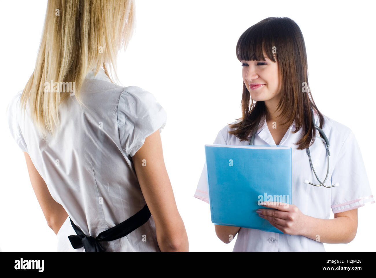 Female doctor and patient at isolated white background Stock Photo - Alamy