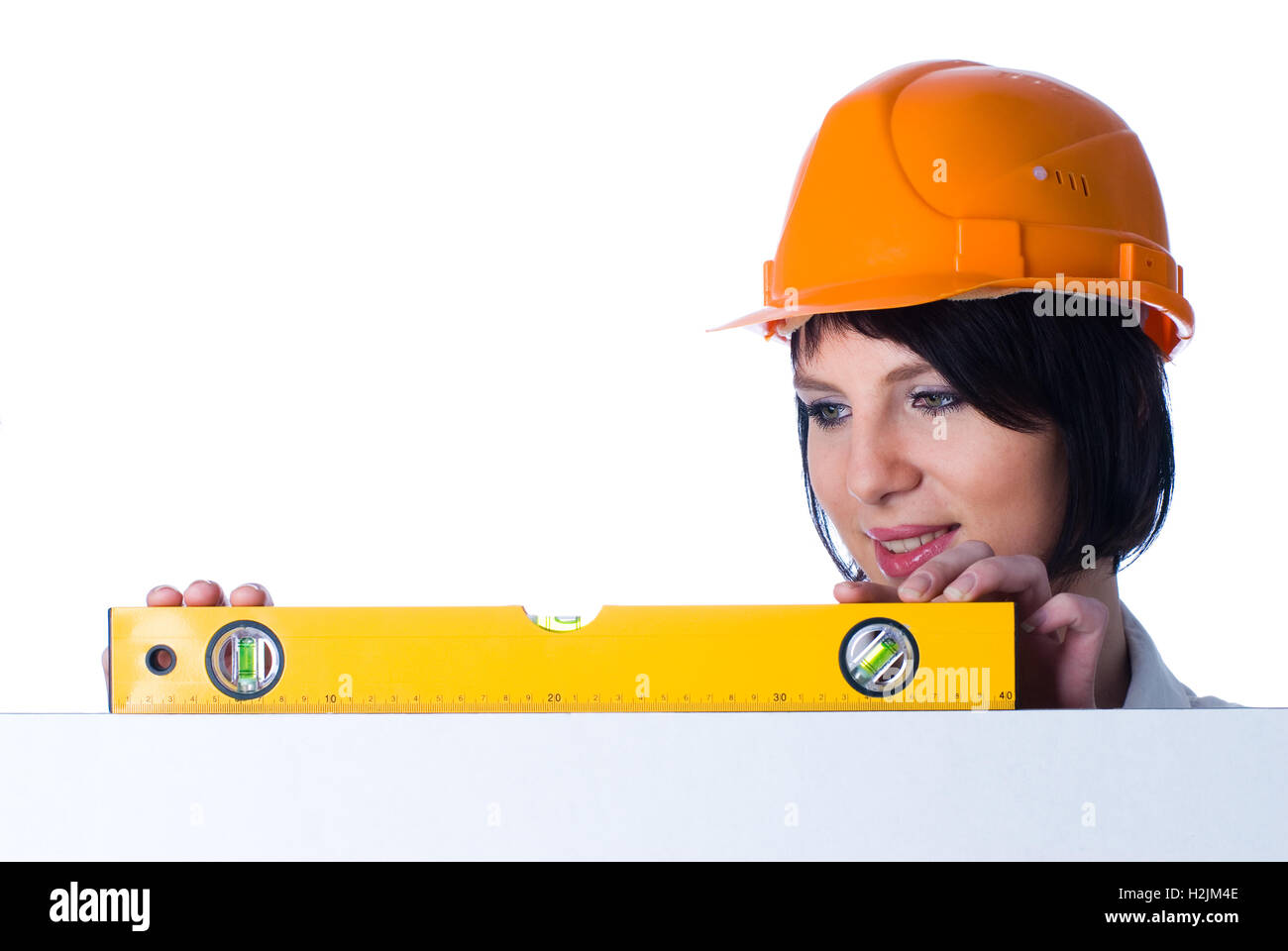 Girl with level Stock Photo - Alamy