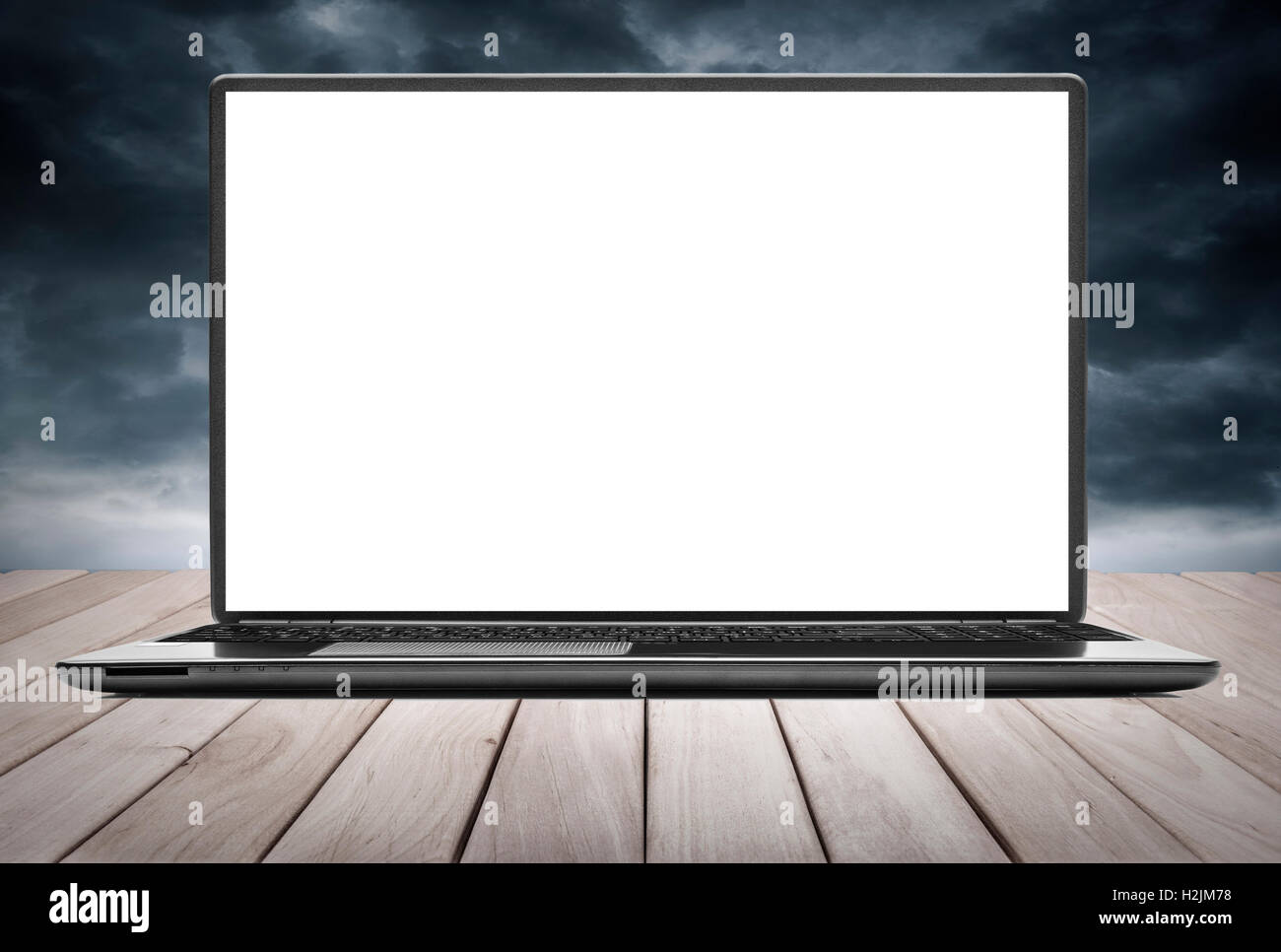 Wood platform and a laptop with a pure white screen Stock Photo - Alamy