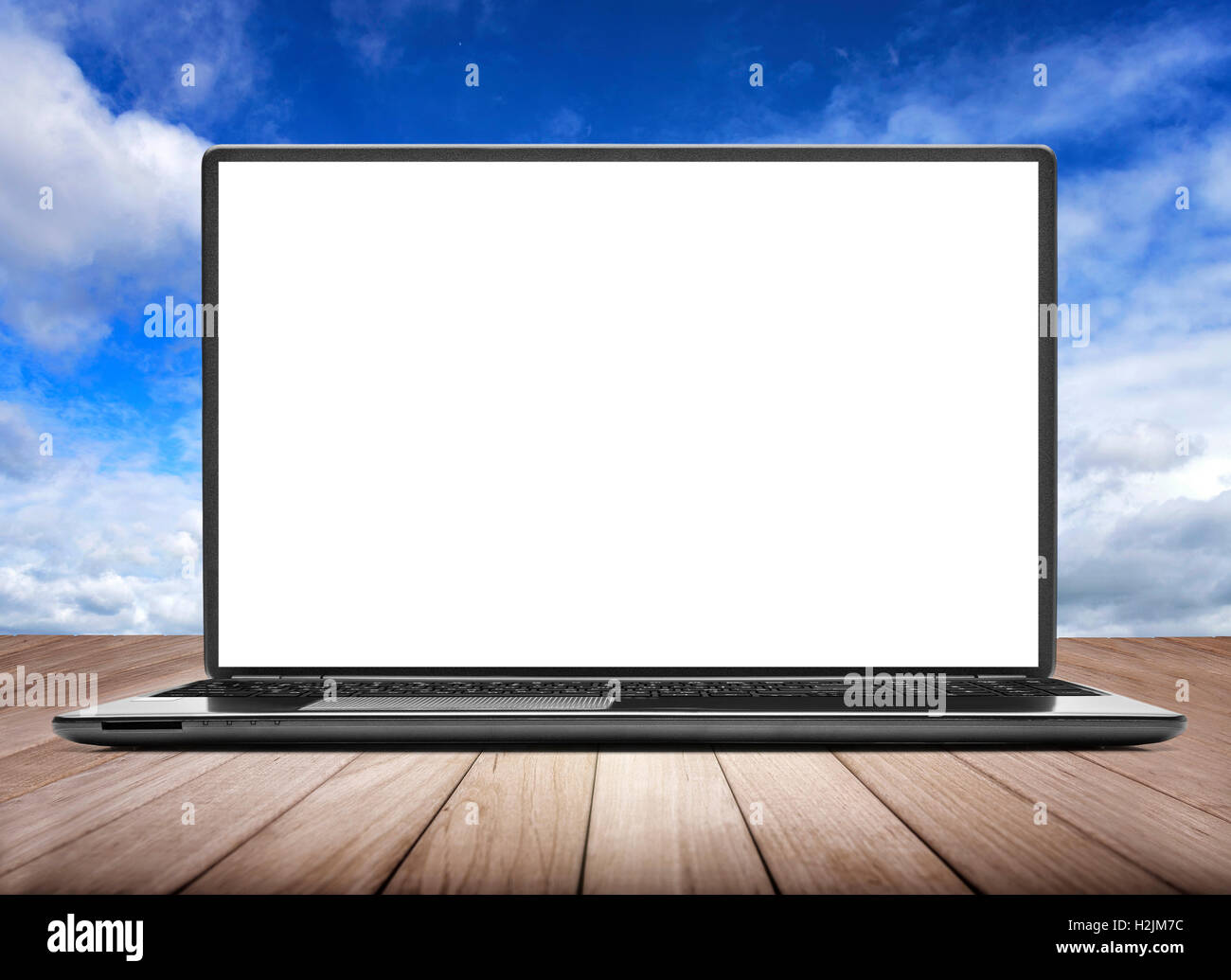 Wood platform and a laptop with a pure white screen Stock Photo - Alamy