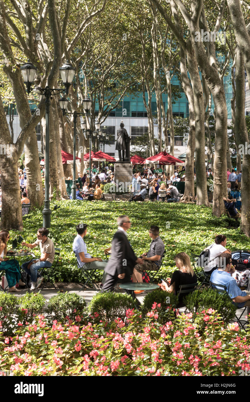 People Enjoying a Fall Day, Bryant Park, NYC Stock Photo - Alamy