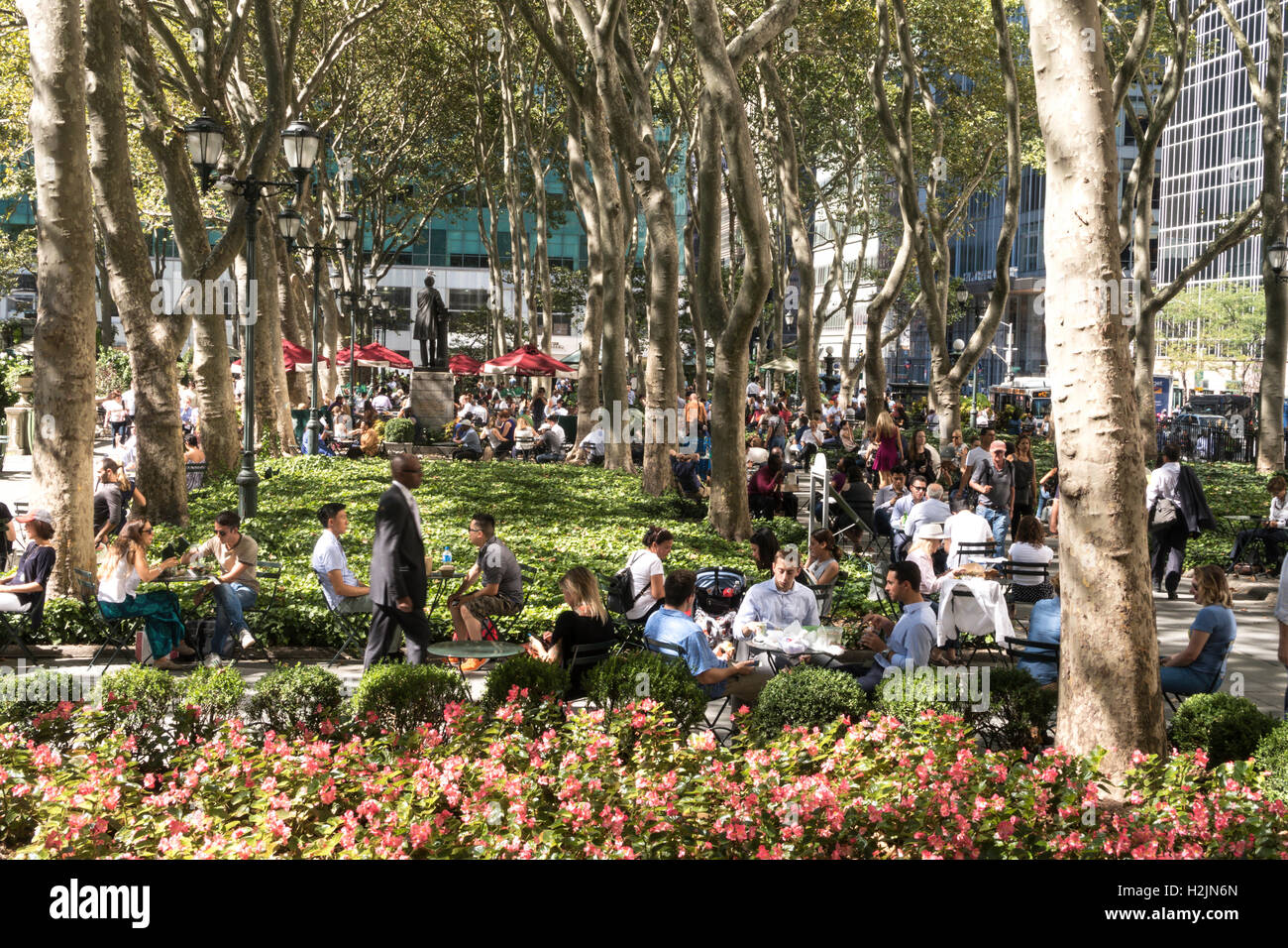 People Enjoying a Fall Day, Bryant Park, NYC Stock Photo - Alamy