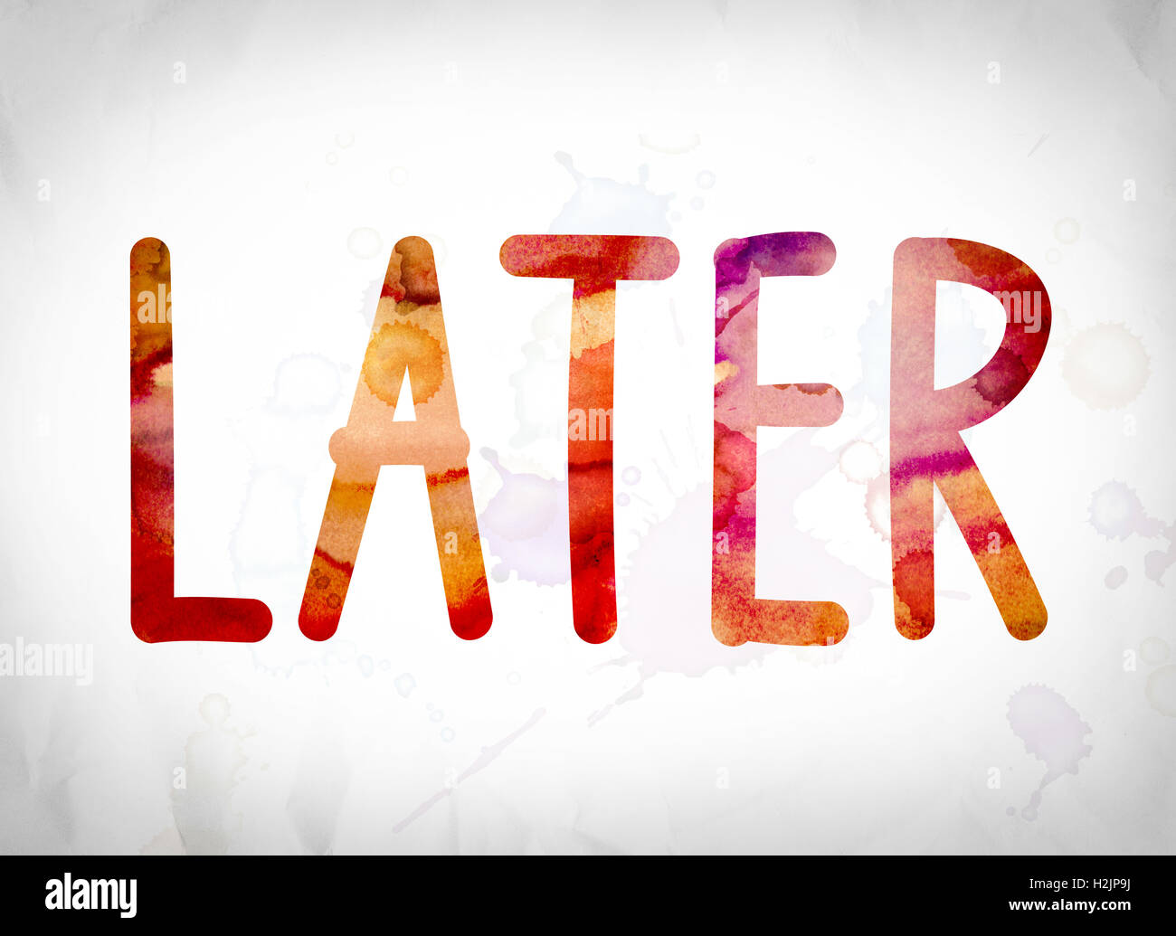 The word "Later" written in watercolor washes over a white paper ...
