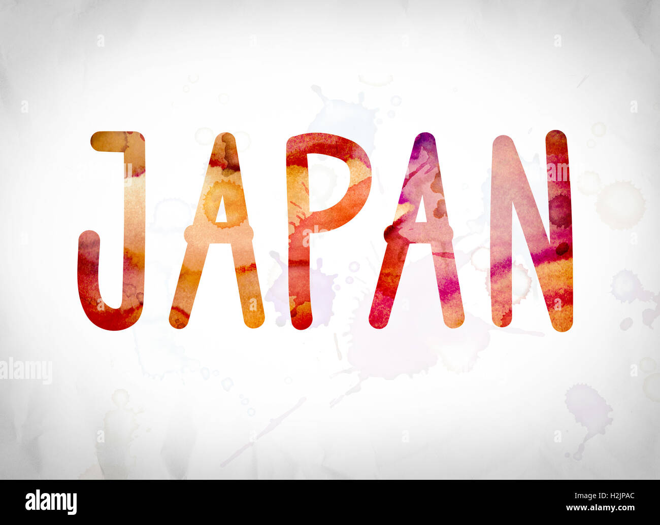 The word "Japan" written in watercolor washes over a white paper ...
