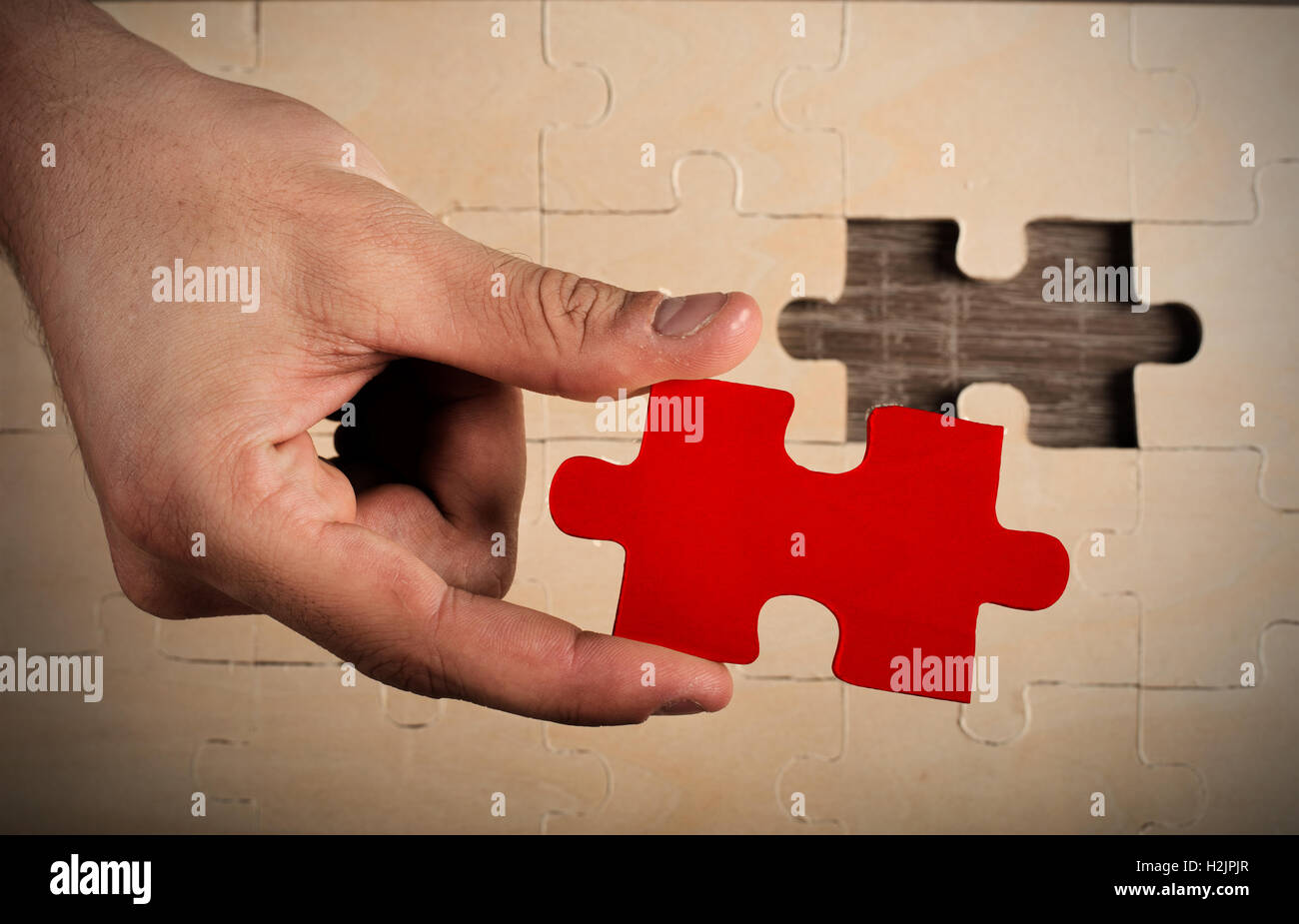 Missing piece of a puzzle Stock Photo - Alamy