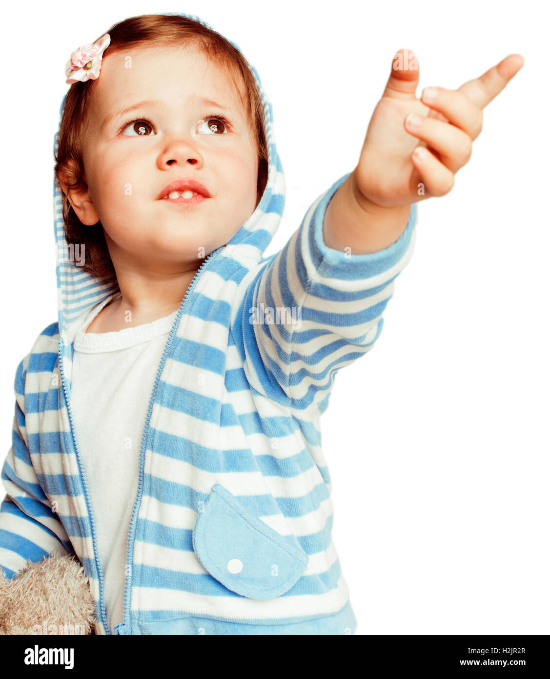 little cute adorable baby girl pointing isolated on white close up ...