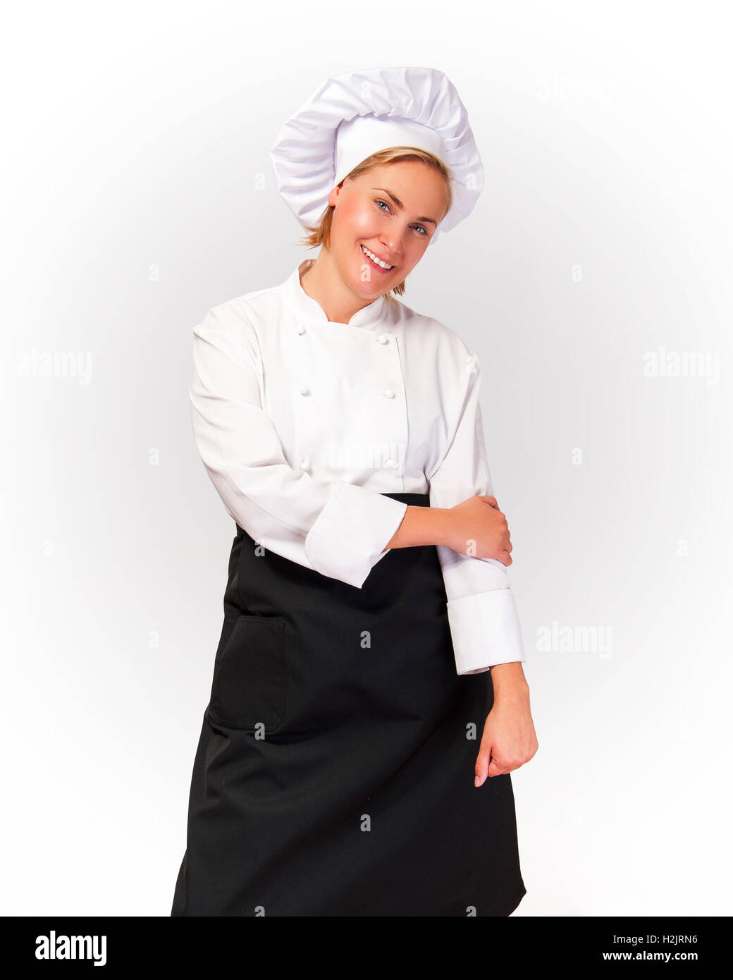 Woman chef smiling over white bacground Stock Photo - Alamy