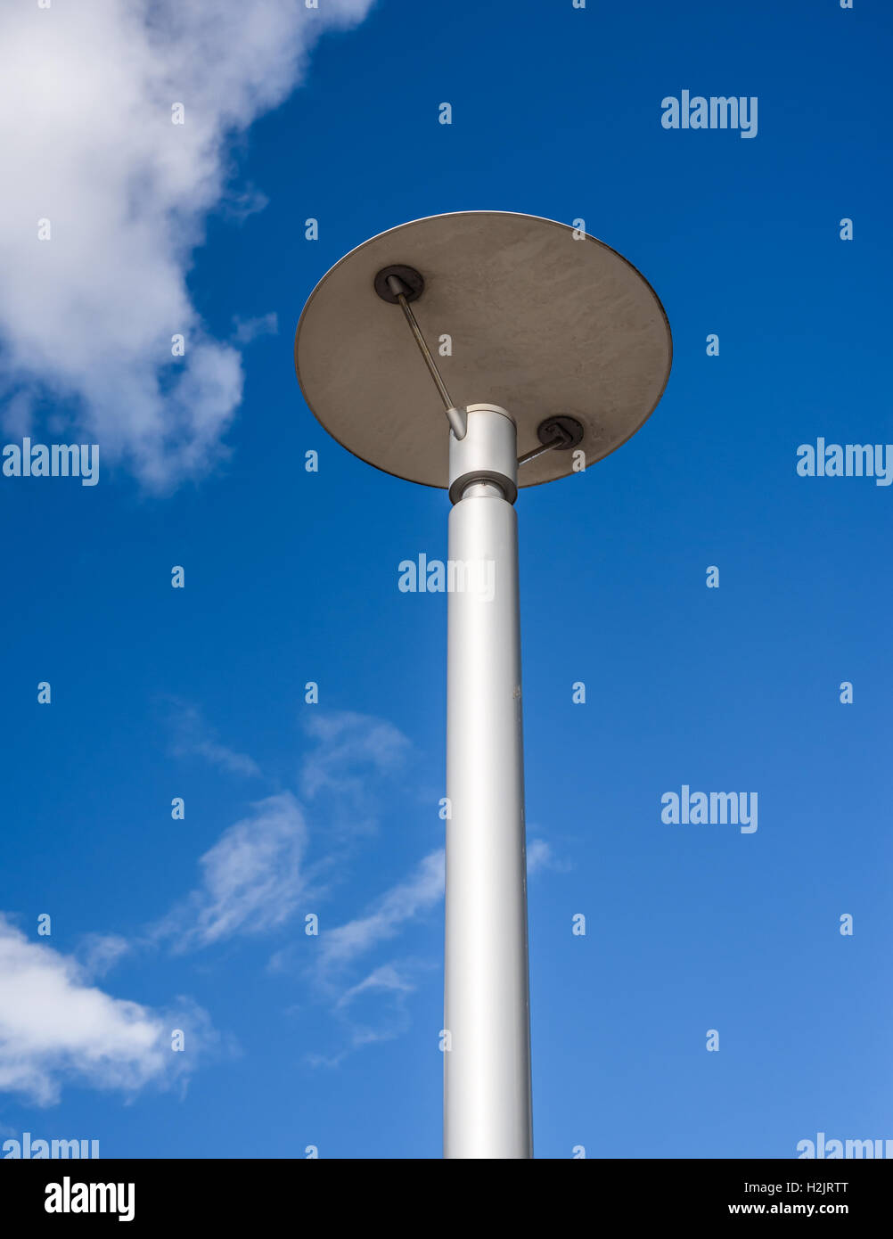 Modern halogen streetlight on a blue background Stock Photo - Alamy