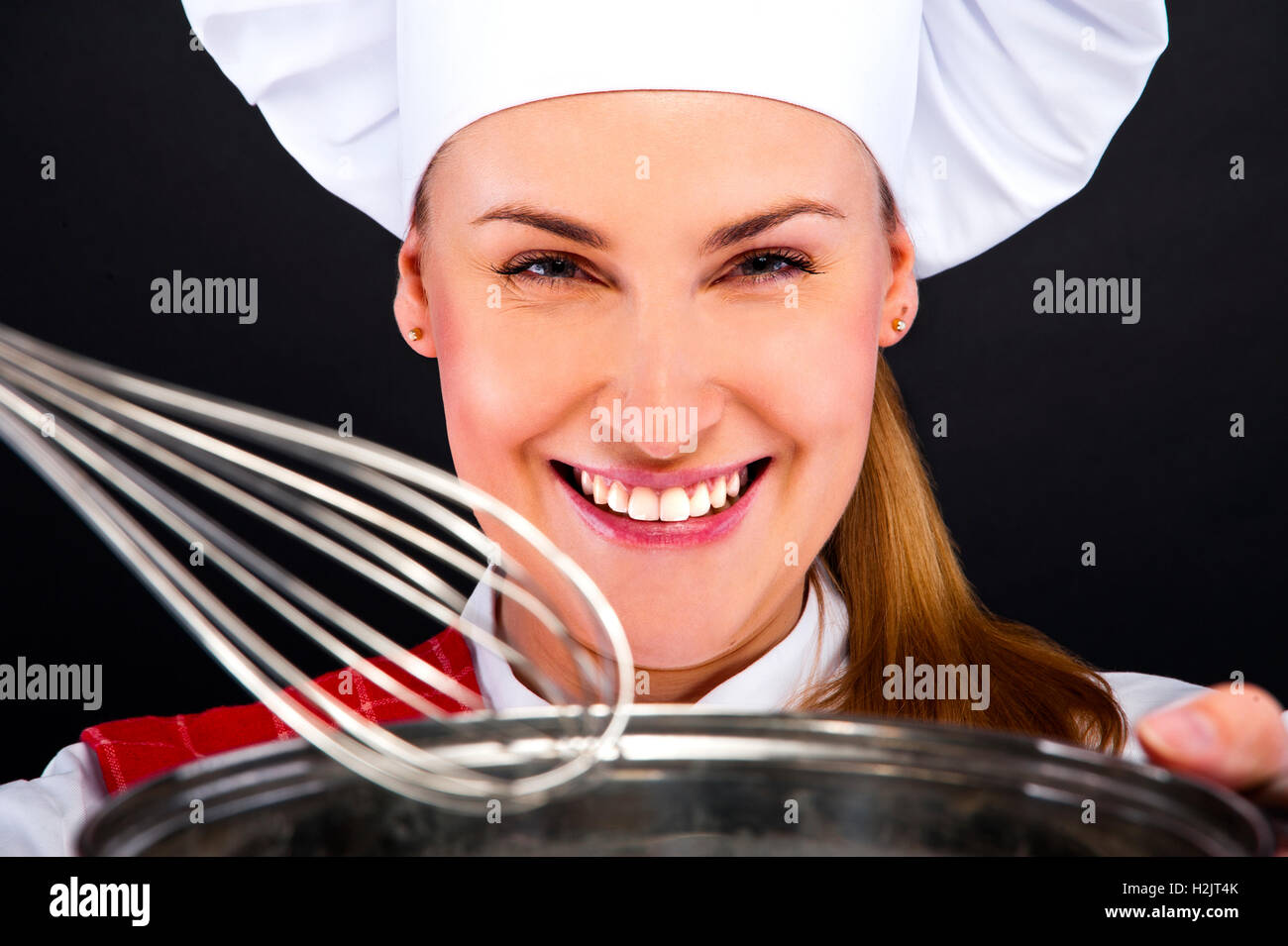 cooking and food concept - smiling female chef with pot and other tools ...
