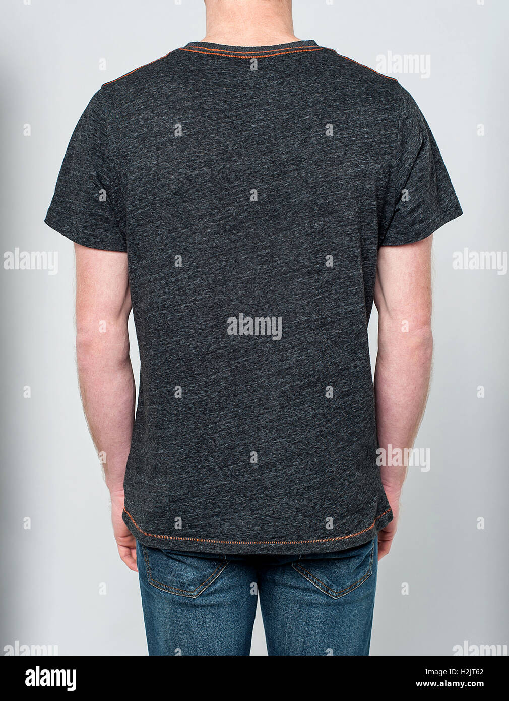 Back pose of stylish young guy Stock Photo - Alamy