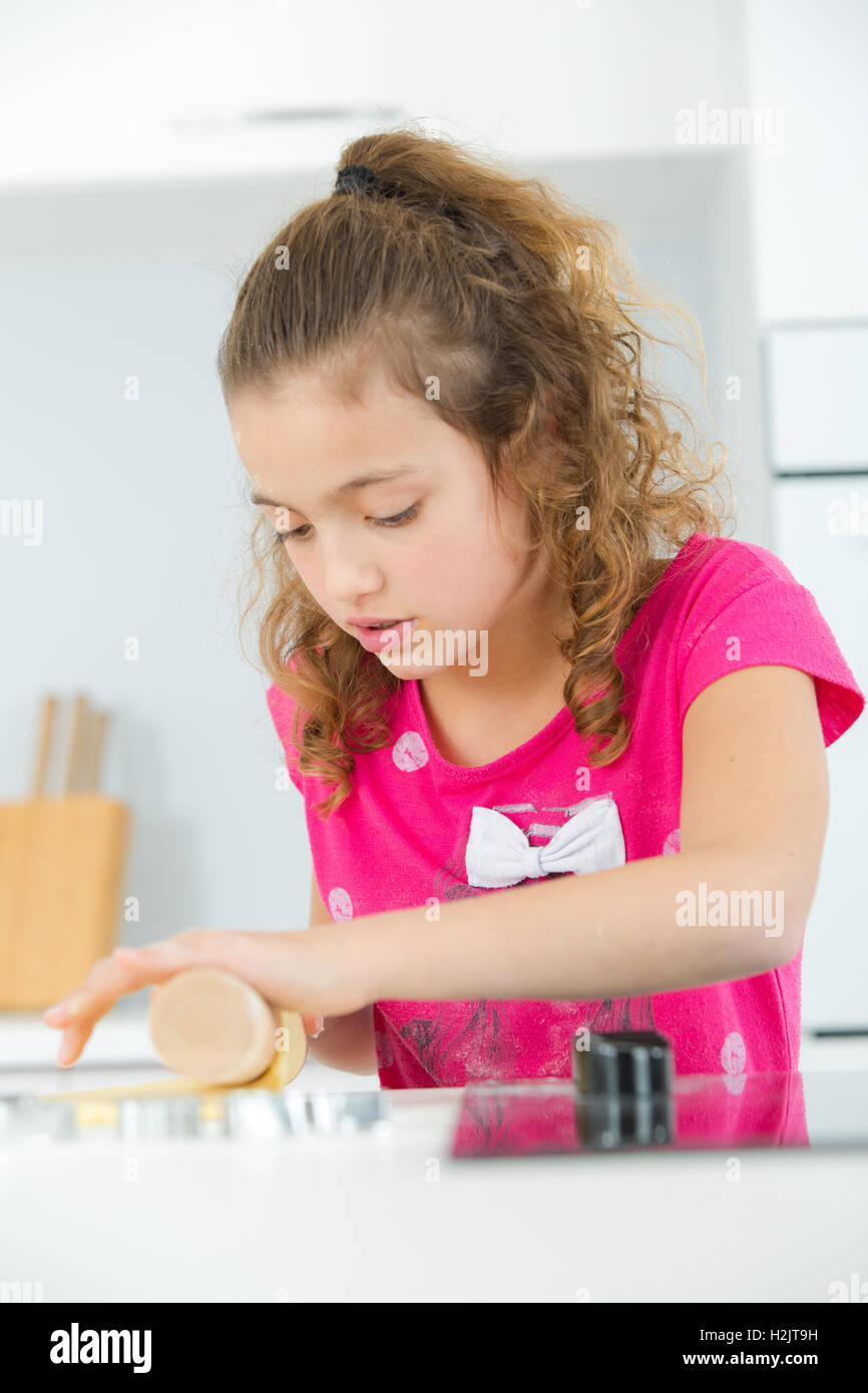 Little girl baking at home Stock Photo - Alamy