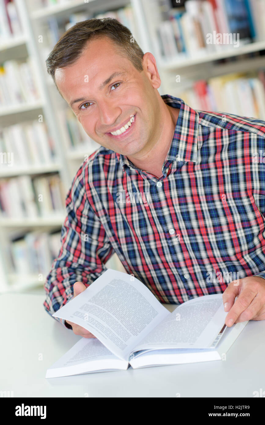 reader smiling on cam Stock Photo - Alamy